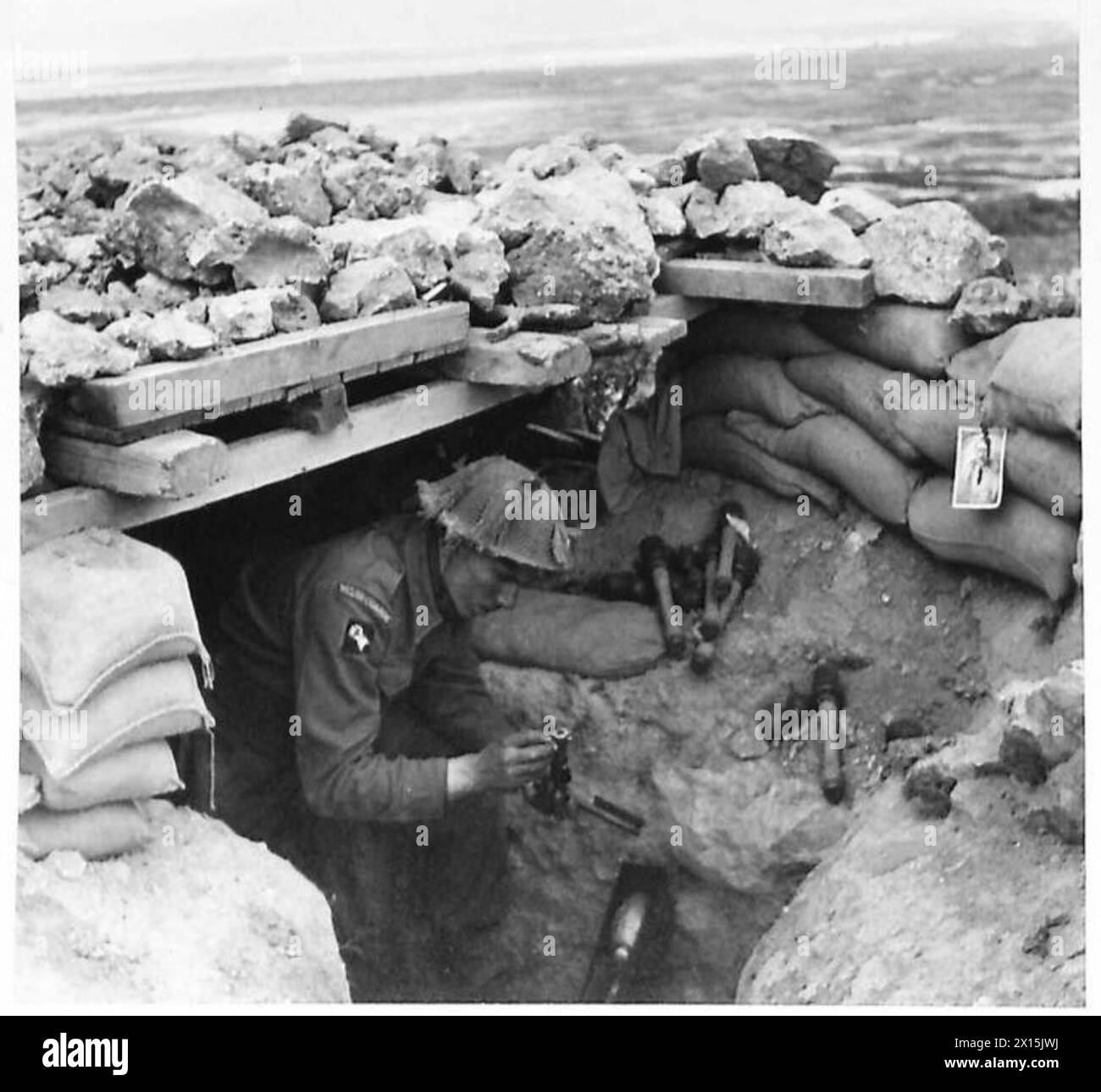 FIRST ARMY ATTACK NORTH OF FONDOUK PASS - A captured German machine gun ...