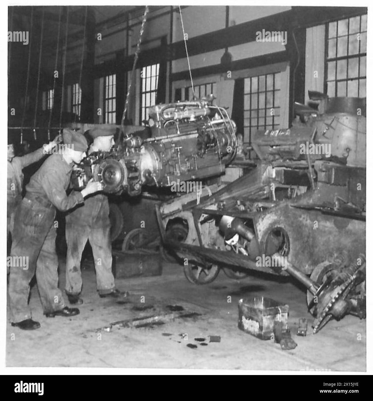 Royal Electrical and Mechanical Engineers fit a new engine into a ...