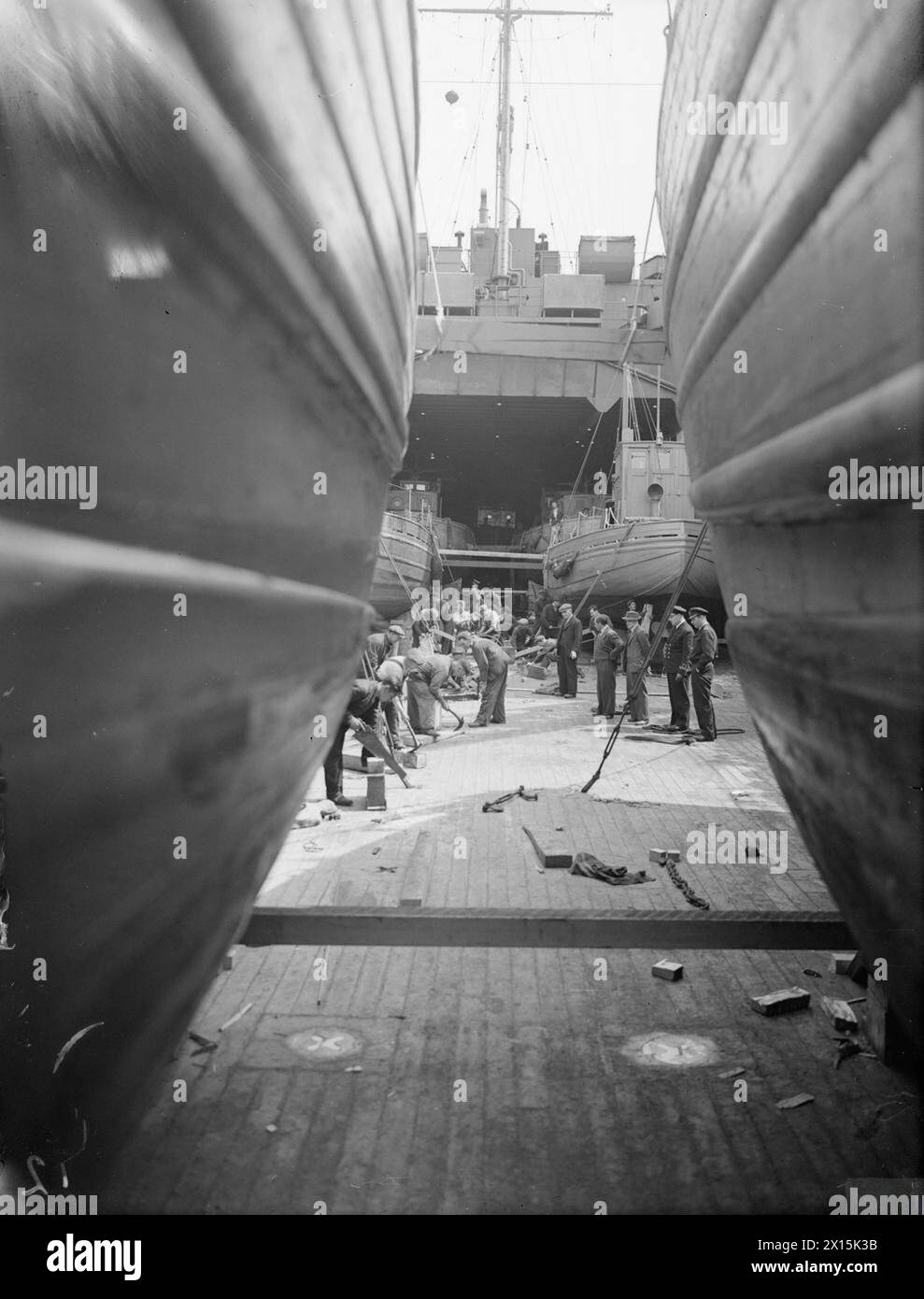 LANDING SHIP DOCK LOADS MOTOR FISHING VESSELS. 17 AND 18 JULY 1944 ...