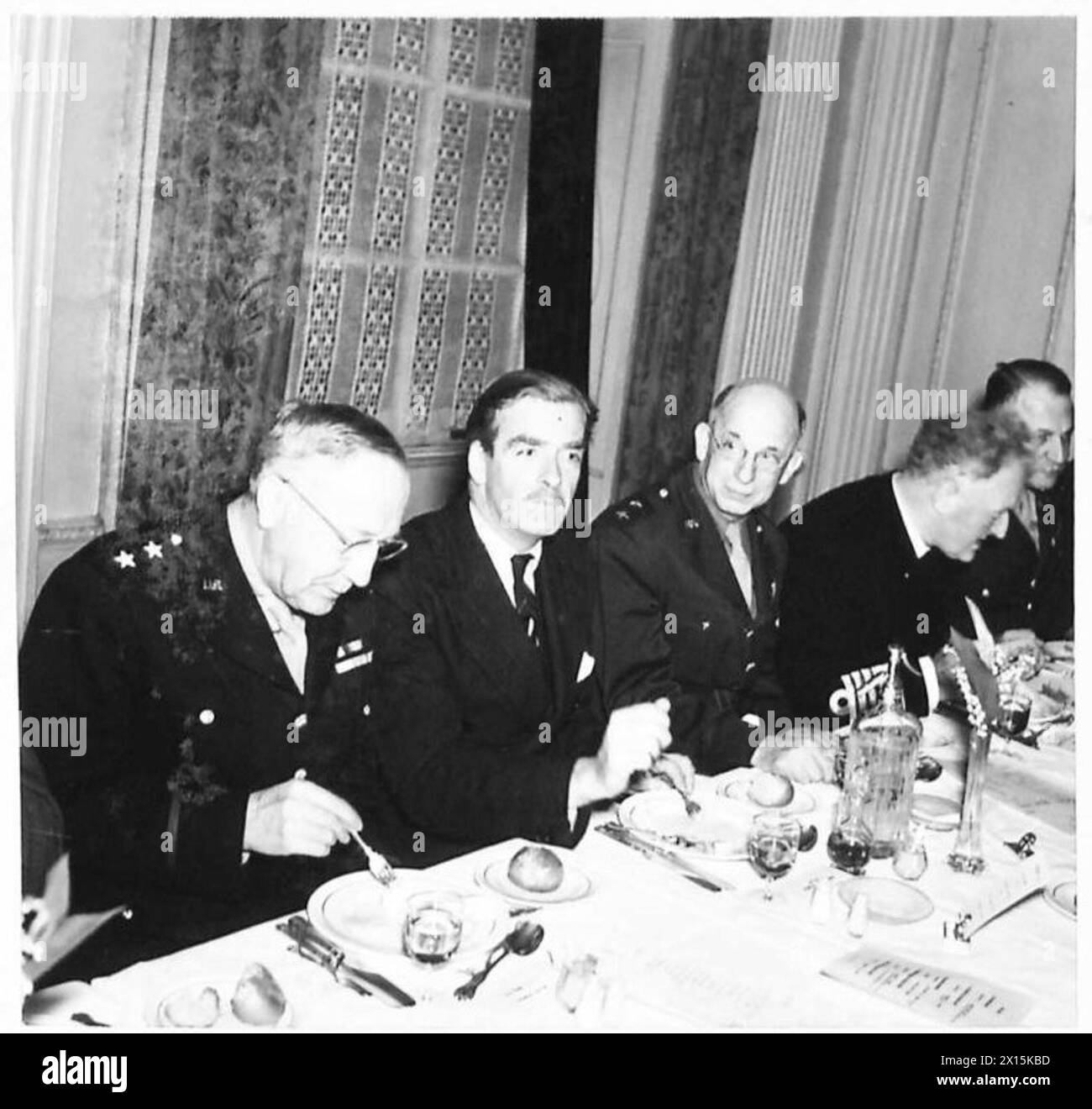 ANGLO-AMERICAN COOPERATION DINNER - The Hon. J.G. Winant (right) and ...
