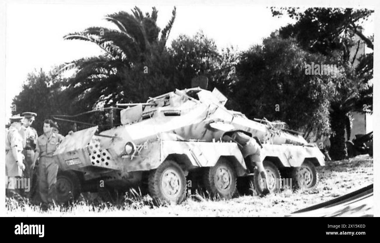 ALLIED WAR CORRESPONDENTS VIEW CAPTURED ENEMY EQUIPMENT - German 8 ...