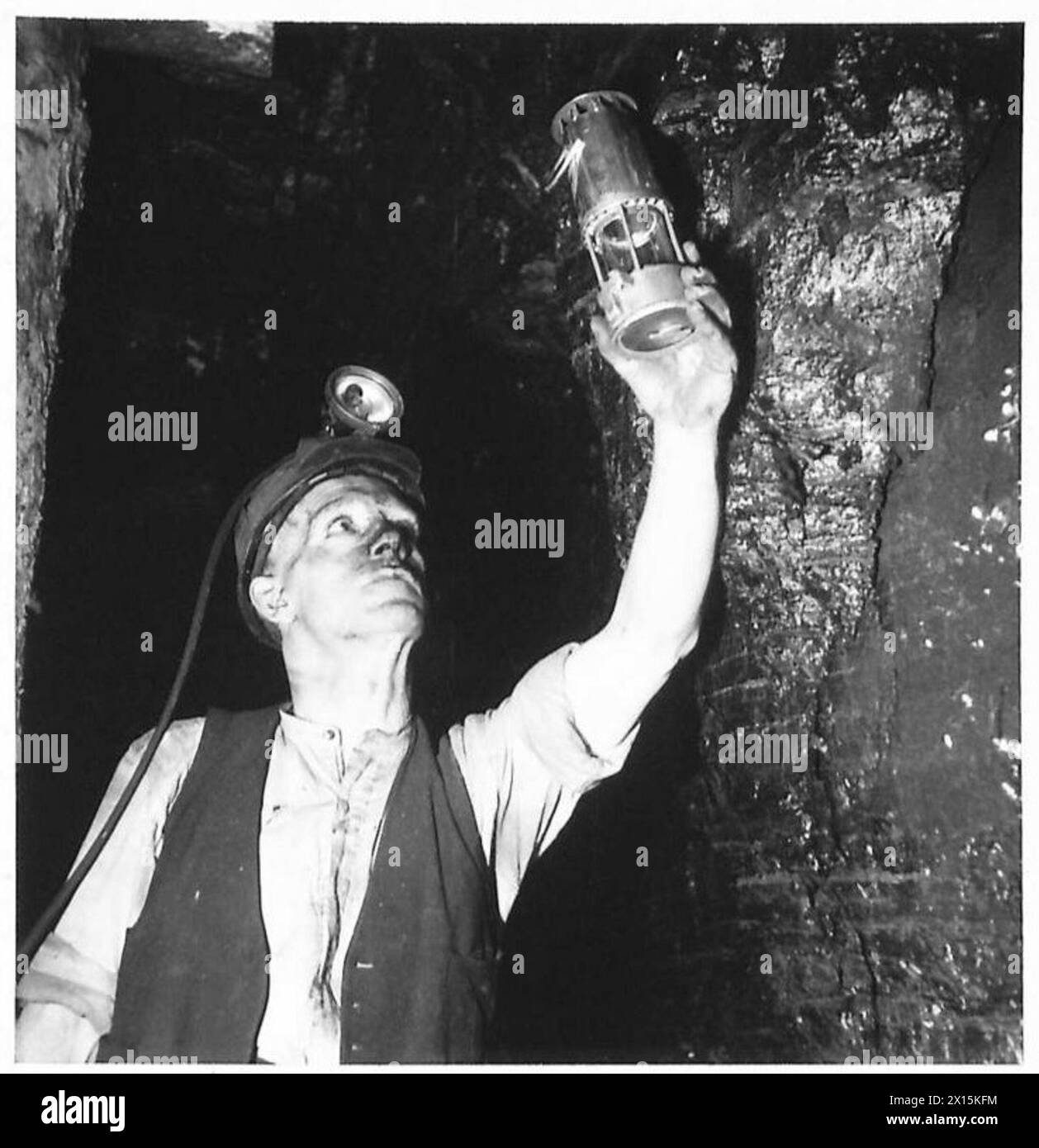 MINERS HOME GUARD PLATOON - Bill Davies examining the coal face British ...