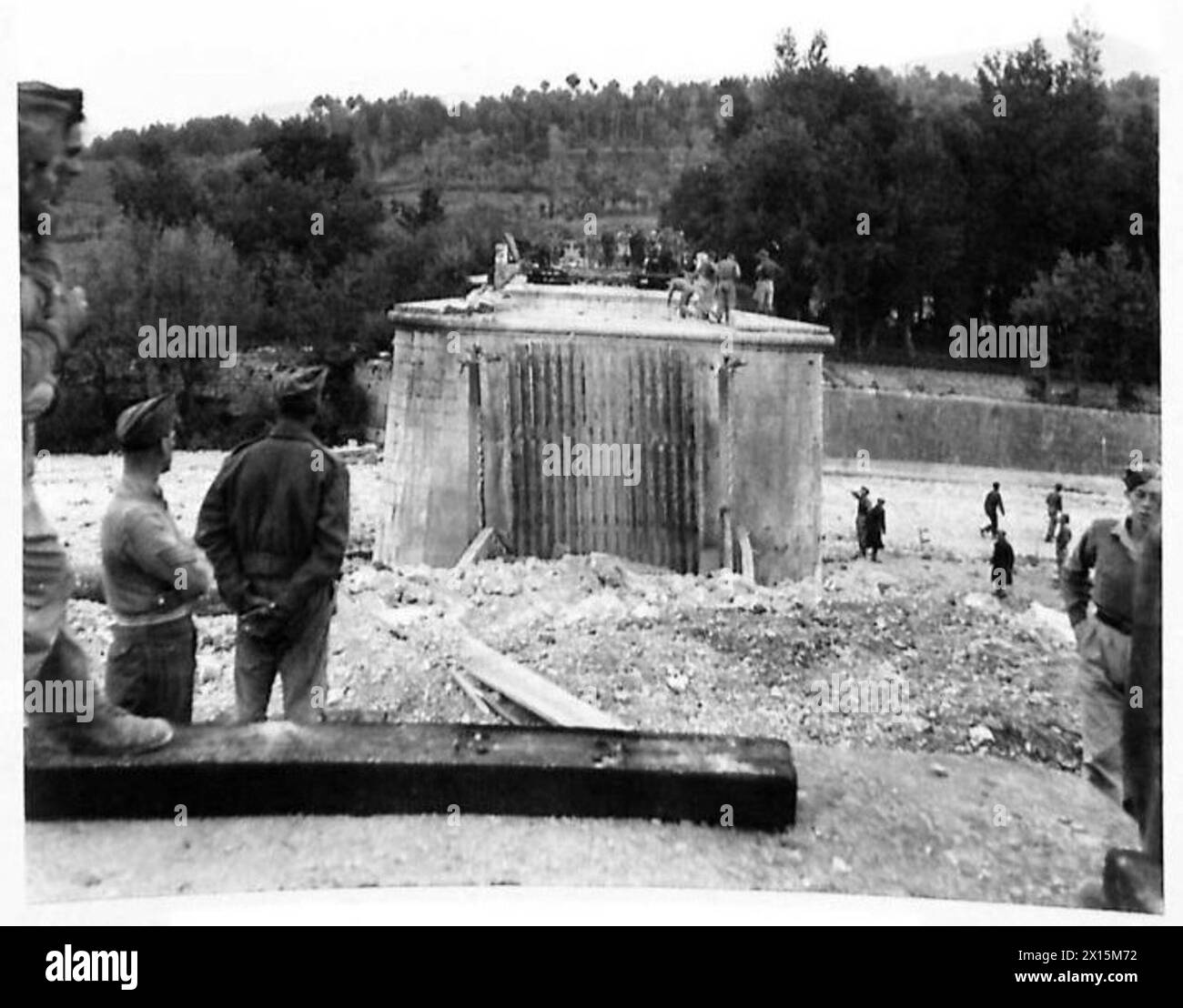 After an explosion, the centre pier of a bridge remains clear of debris ...