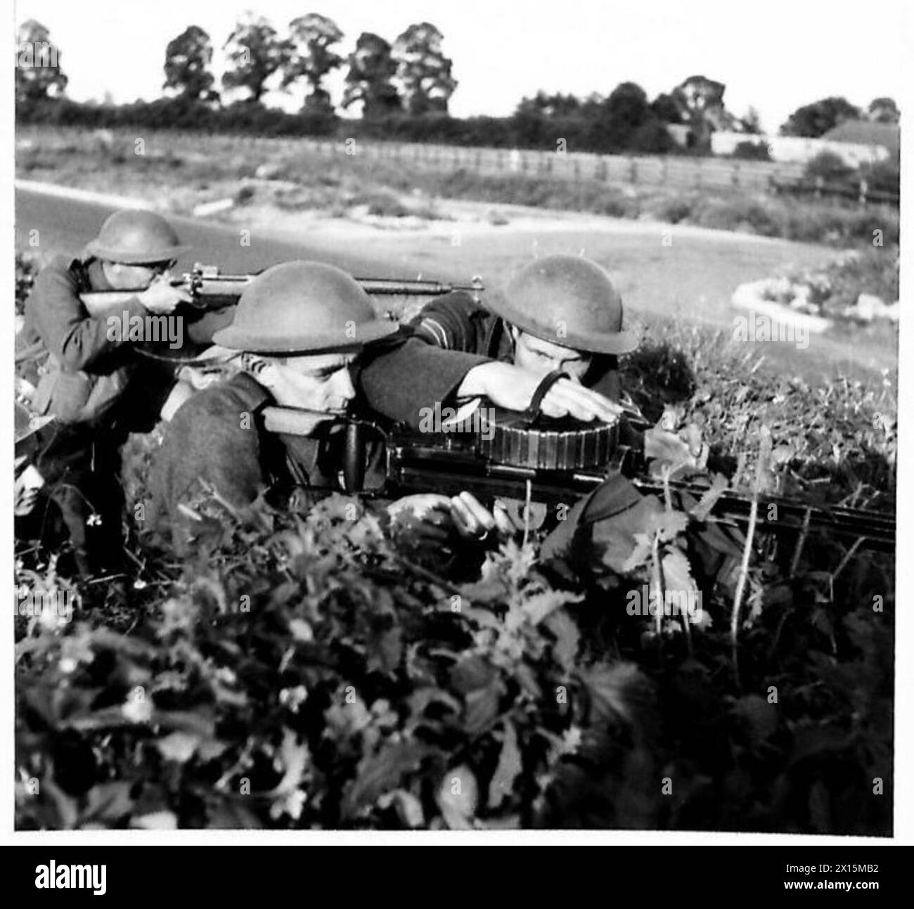 HOME GUARD DEFEND AERODROME - A machine gun post covering a road ...