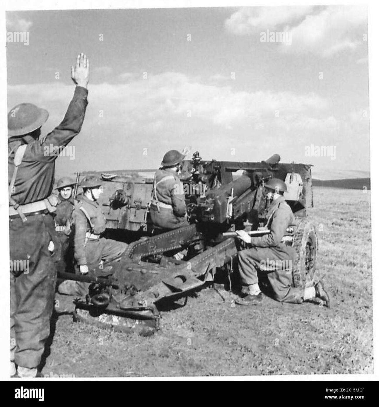 A FIELD REGIMENT, ROYAL ARTILLERY,ON THE RANGES - Ready to fire ...
