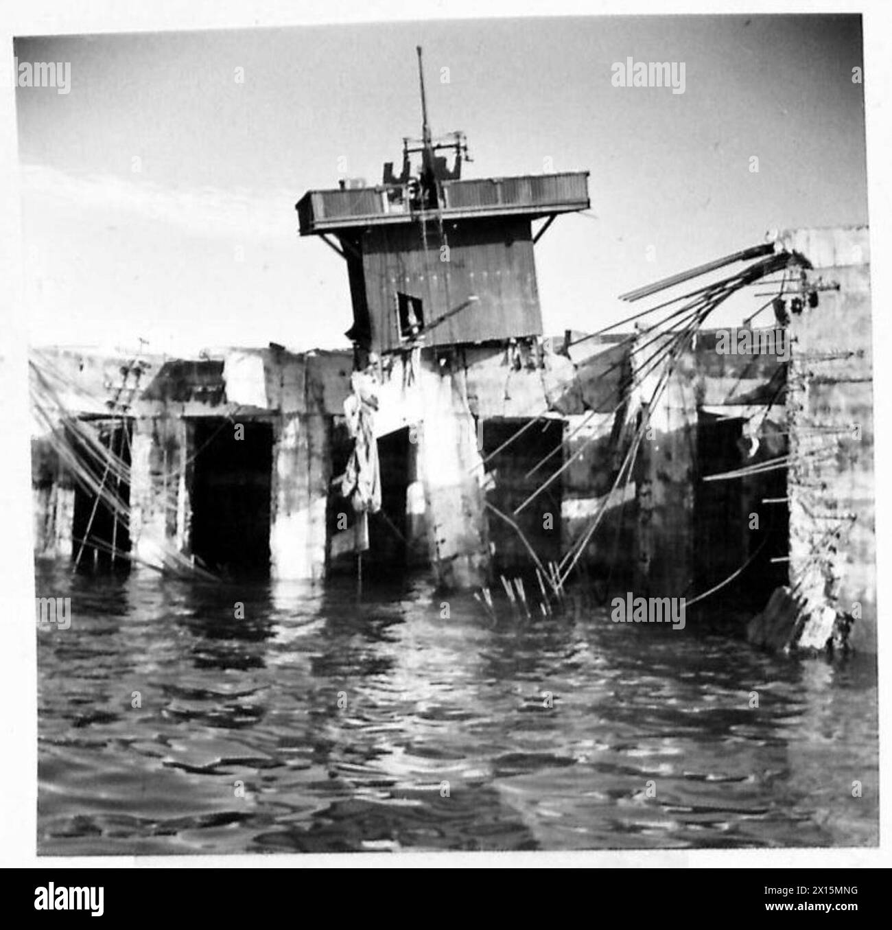 Construction of a floating port at Arromanches, Normandy, showing ...