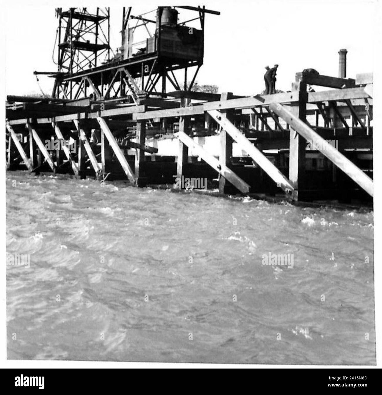 A new jetty at Larne, Co. Antrim is under construction, with pile caps ...