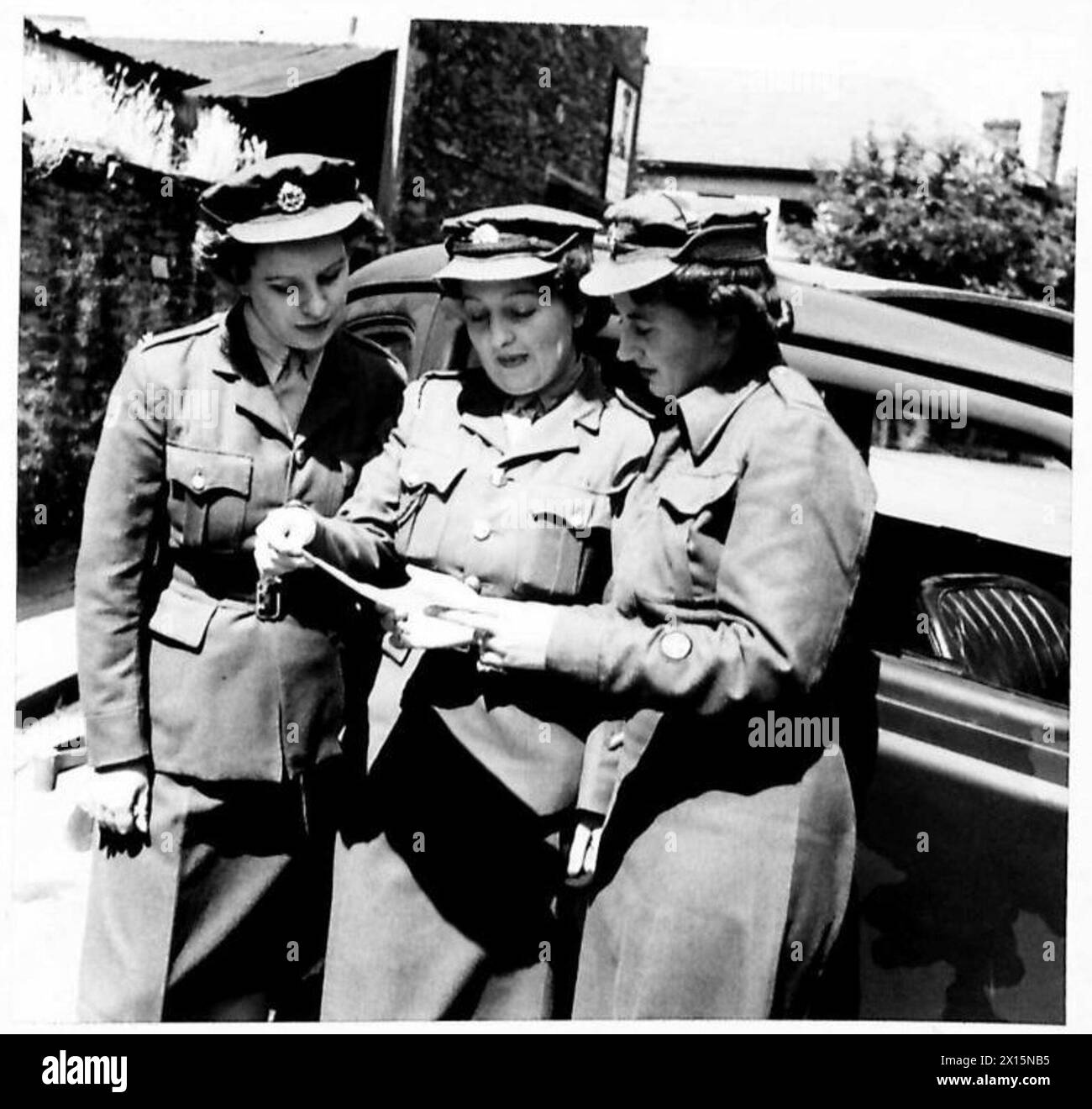 Private Beryl Jones, an ATS driver, receives a Certificate of Merit and ...