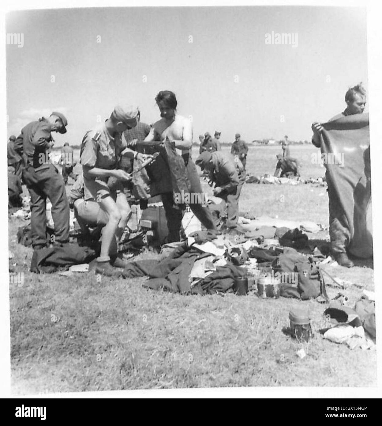 German prisoners at a Fifth Army prisoner of war camp have their ...