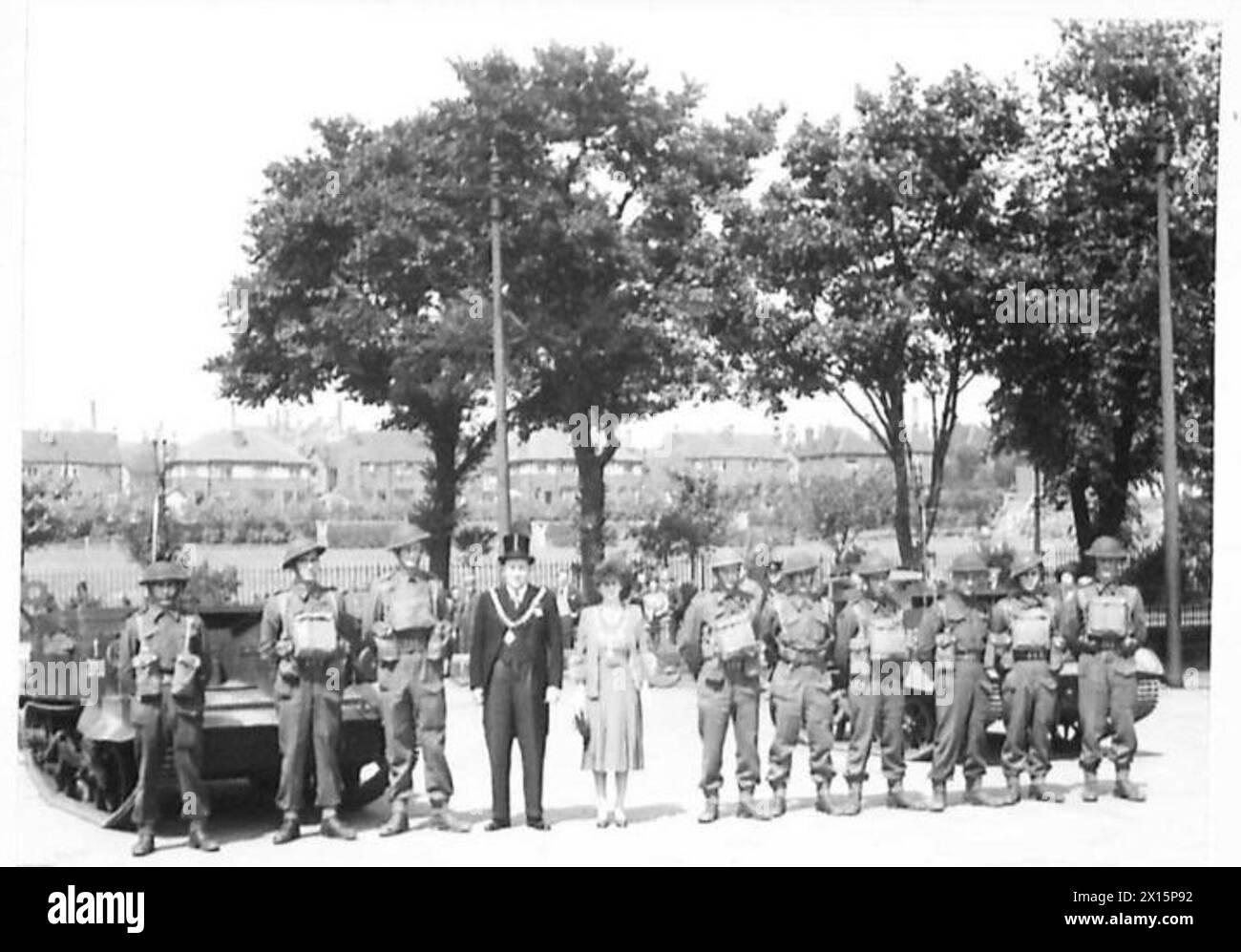 The Lord Mayor and Lady Mayoress are photographed with troops acting as ...
