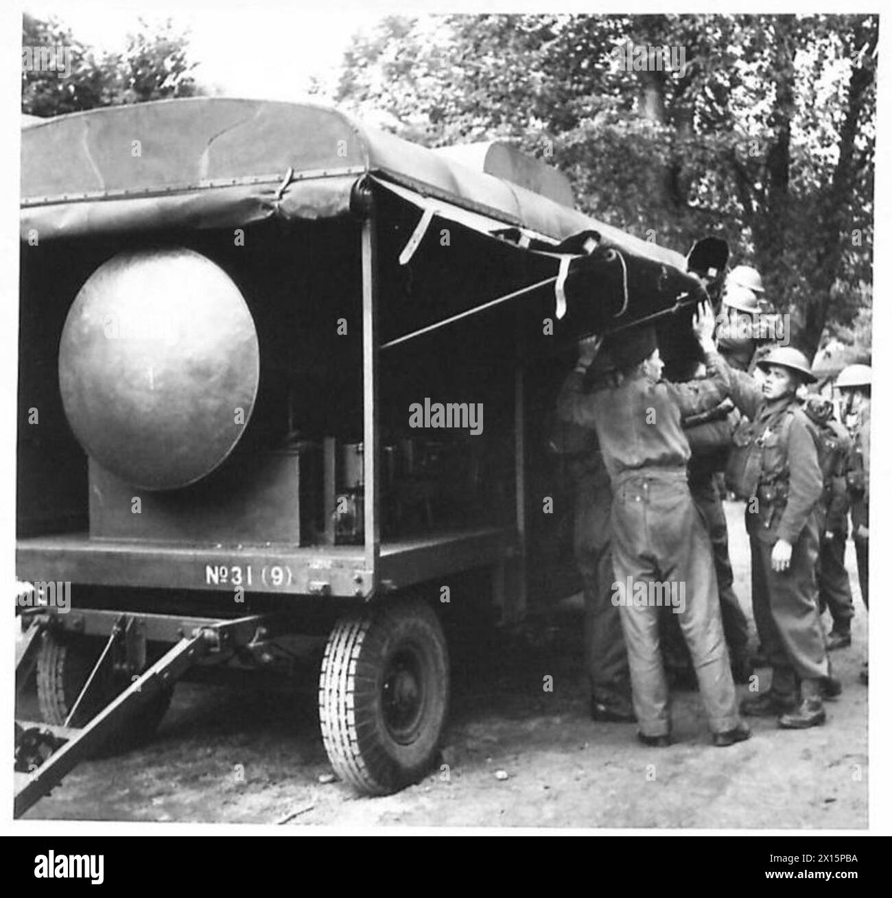 THE SOLDIERS MOBILE LAUNDRY - On arrival at the new area, men attached ...