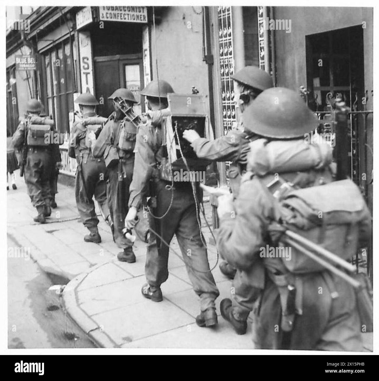 Enemy soldiers operating a portable radio telephony set in a South ...