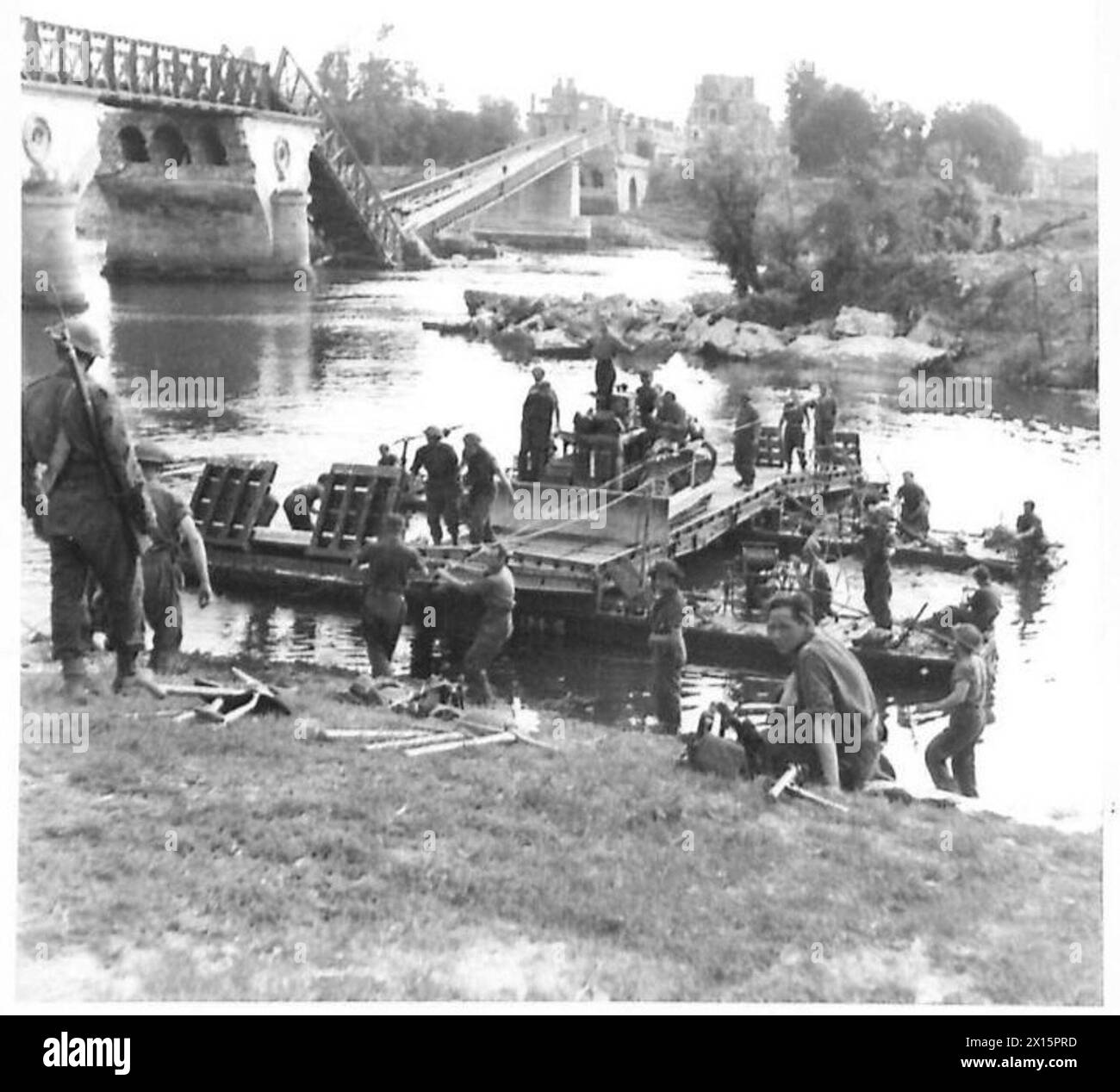 THE CROSSING OF THE RIVER SEINE - A Bulldozer is brought safely across ...