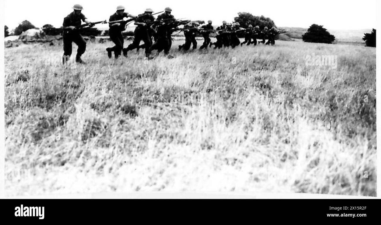 INFANTRY IN TRAINING - The platoon charges a position with fixed ...