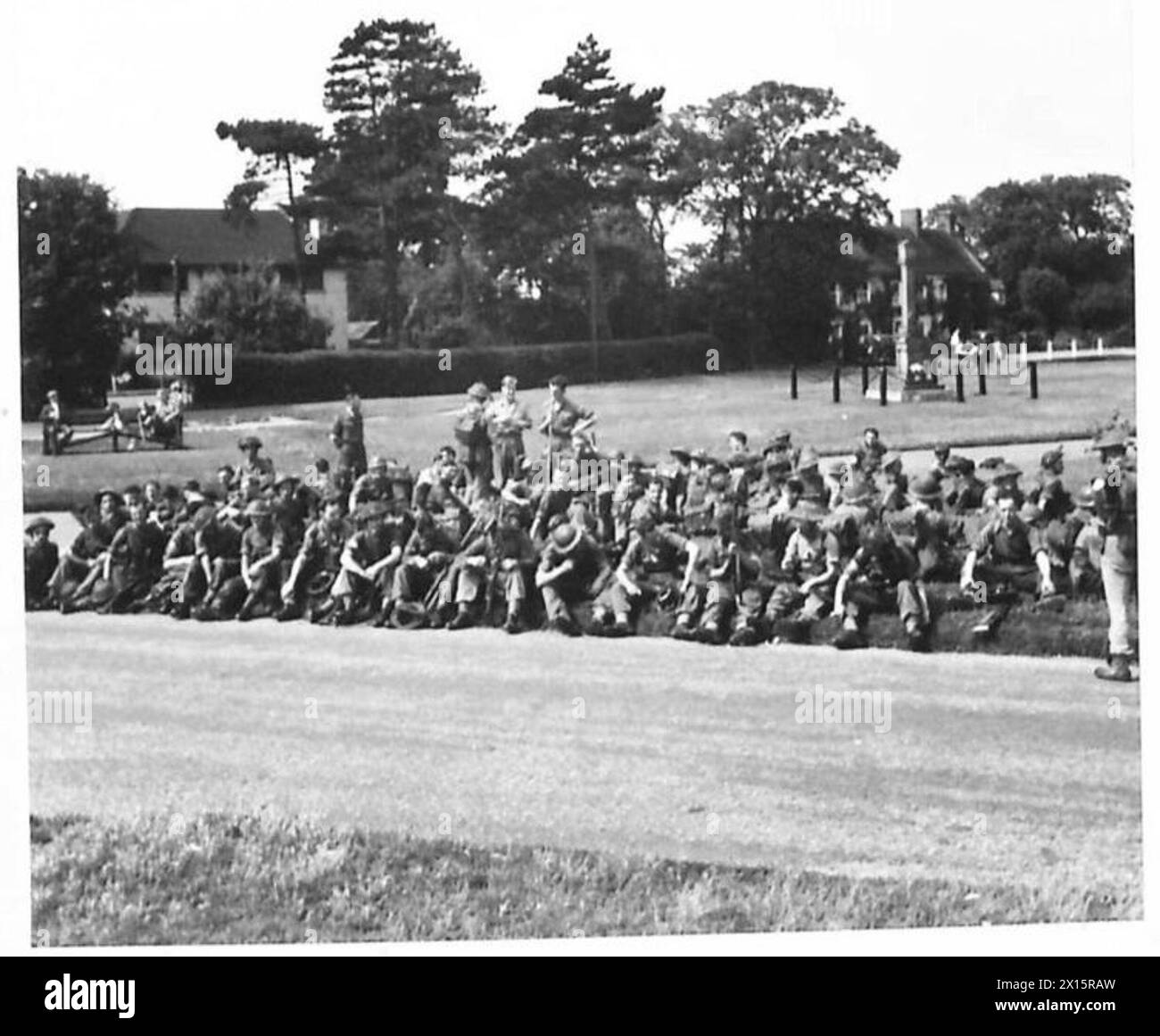 BATTLE SCHOOL EXERCISE - Troops resting by the roadside after capturing ...