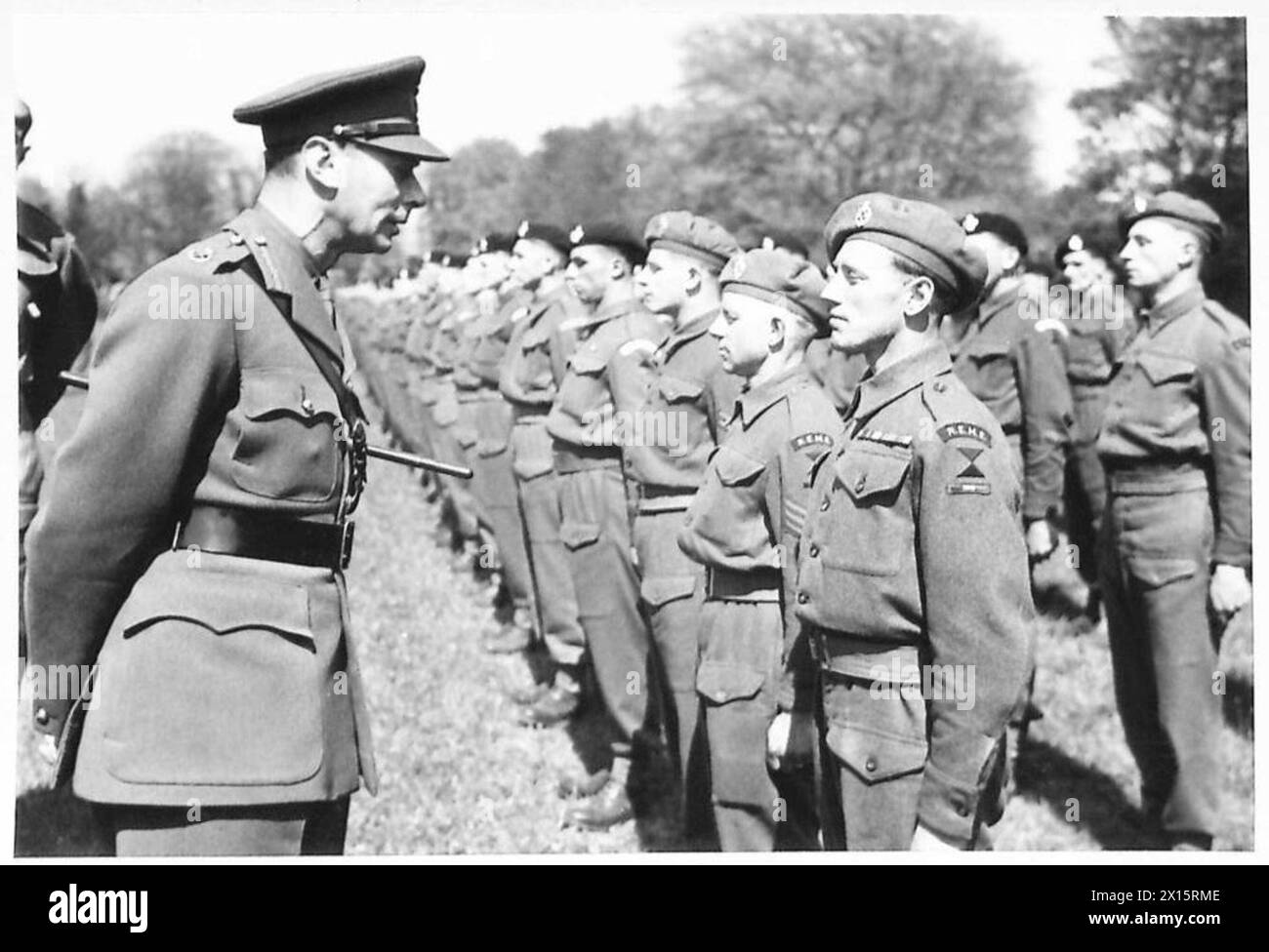 His Majesty the King talks with a R.E.M.E. soldier attached to an ...