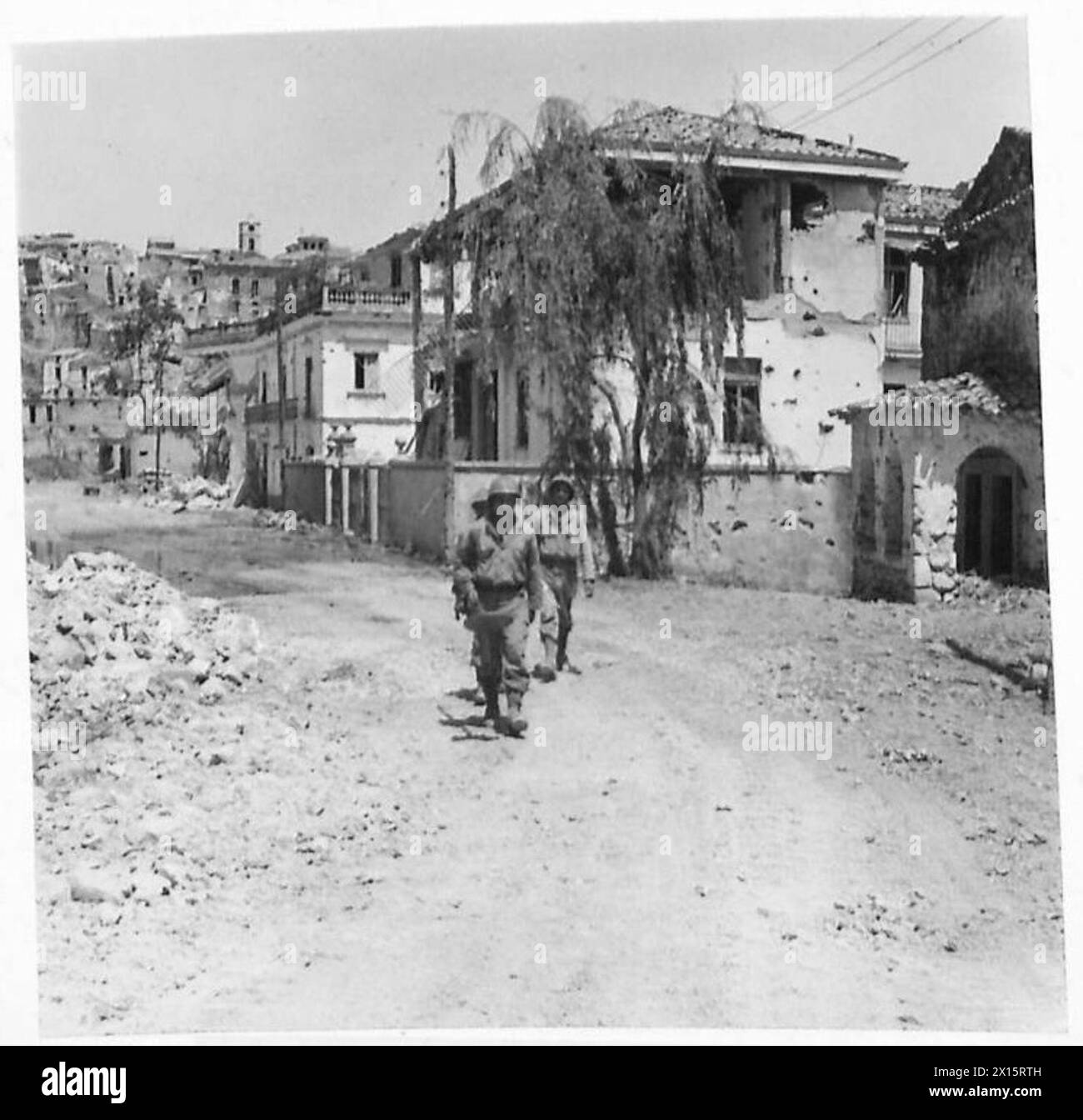 French troops advance by clearing mines in the town of S. Giovanni ...