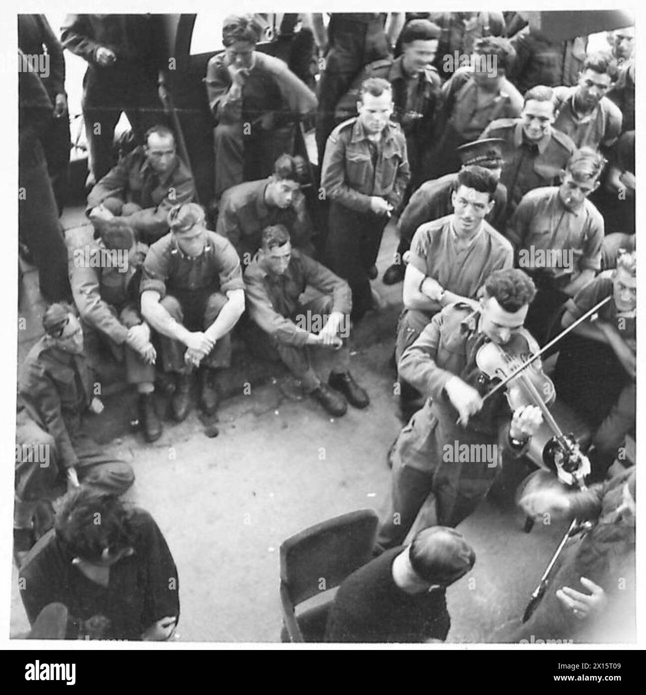 TRAINING FOR COMBINED OPERATIONS - Troops listening to an impromptu ...