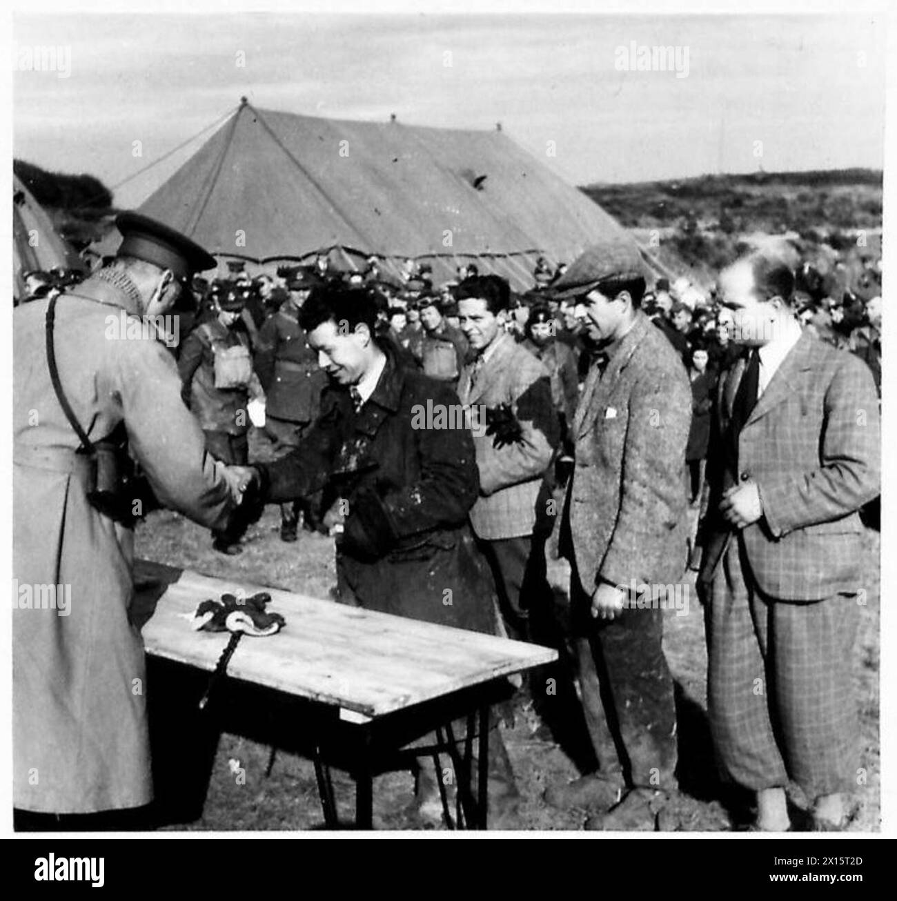 Major-General B.T. Wilson presents prizes during a British Army ...