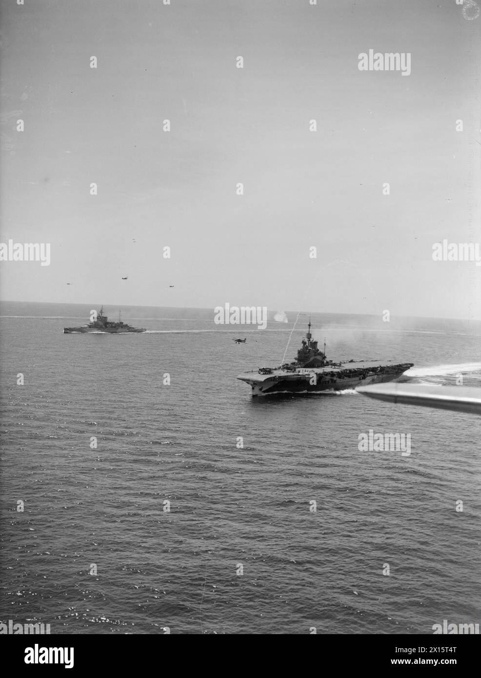 Fairey Albacore aircraft of the Fleet Air Arm conduct practice torpedo ...
