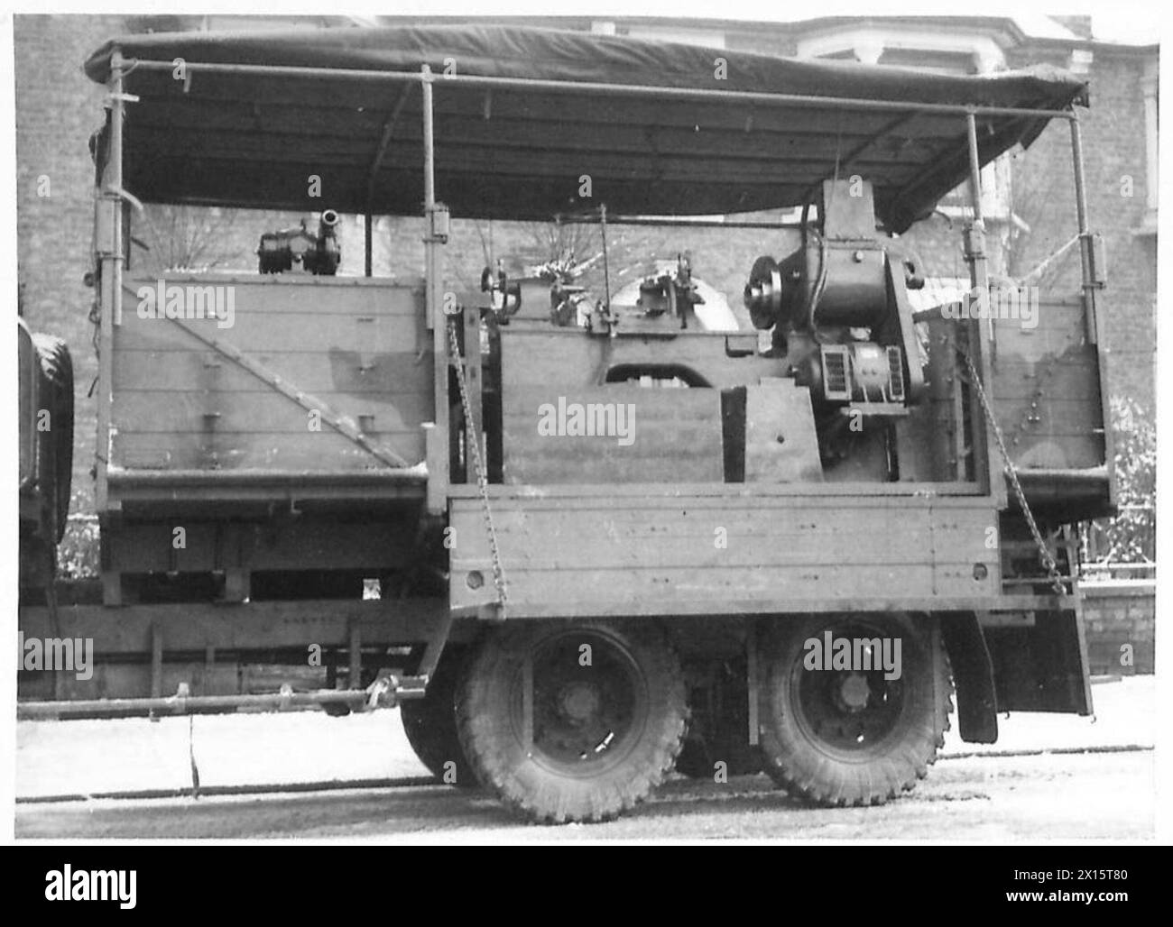 View of an E. and M. type M/C lorry fitted with a 7.5 kW generator at ...