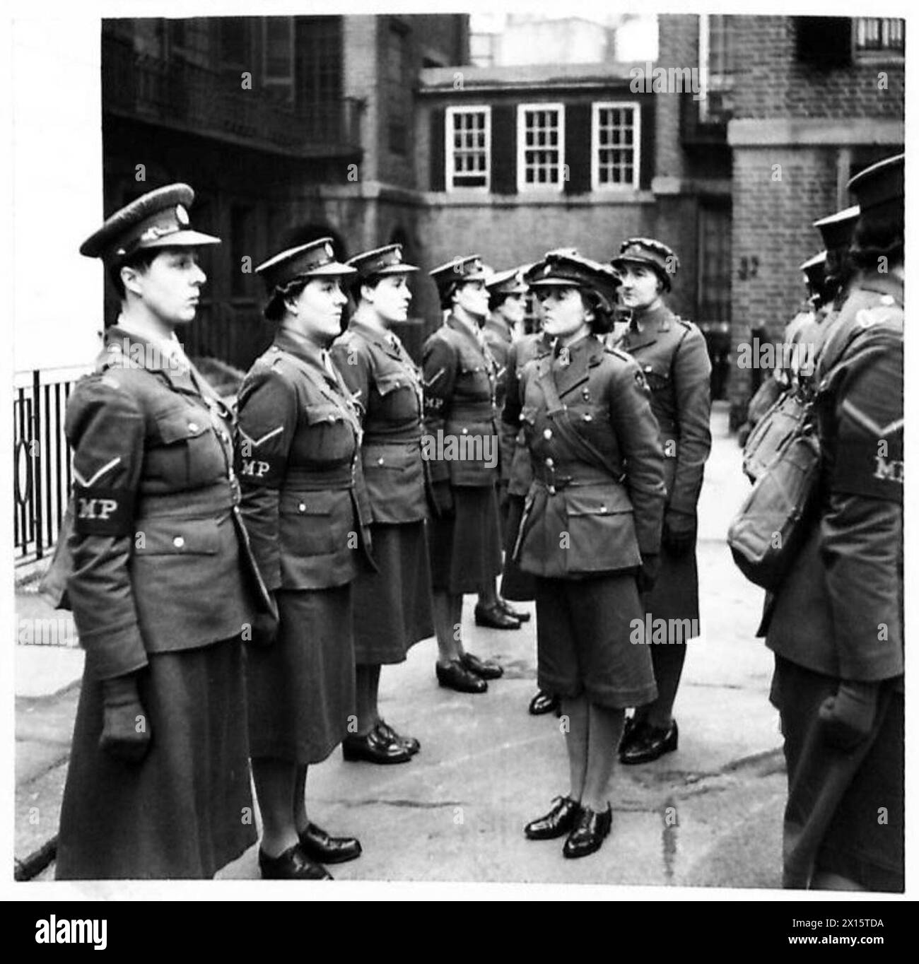 Junior Commandant Jill McDermot supervises an ATS Military Police ...