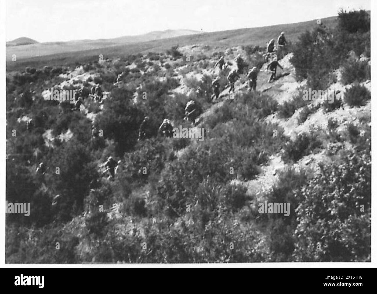 BATTLE EXERCISES in TUNISIA - Troops advancing up the sides of the ...