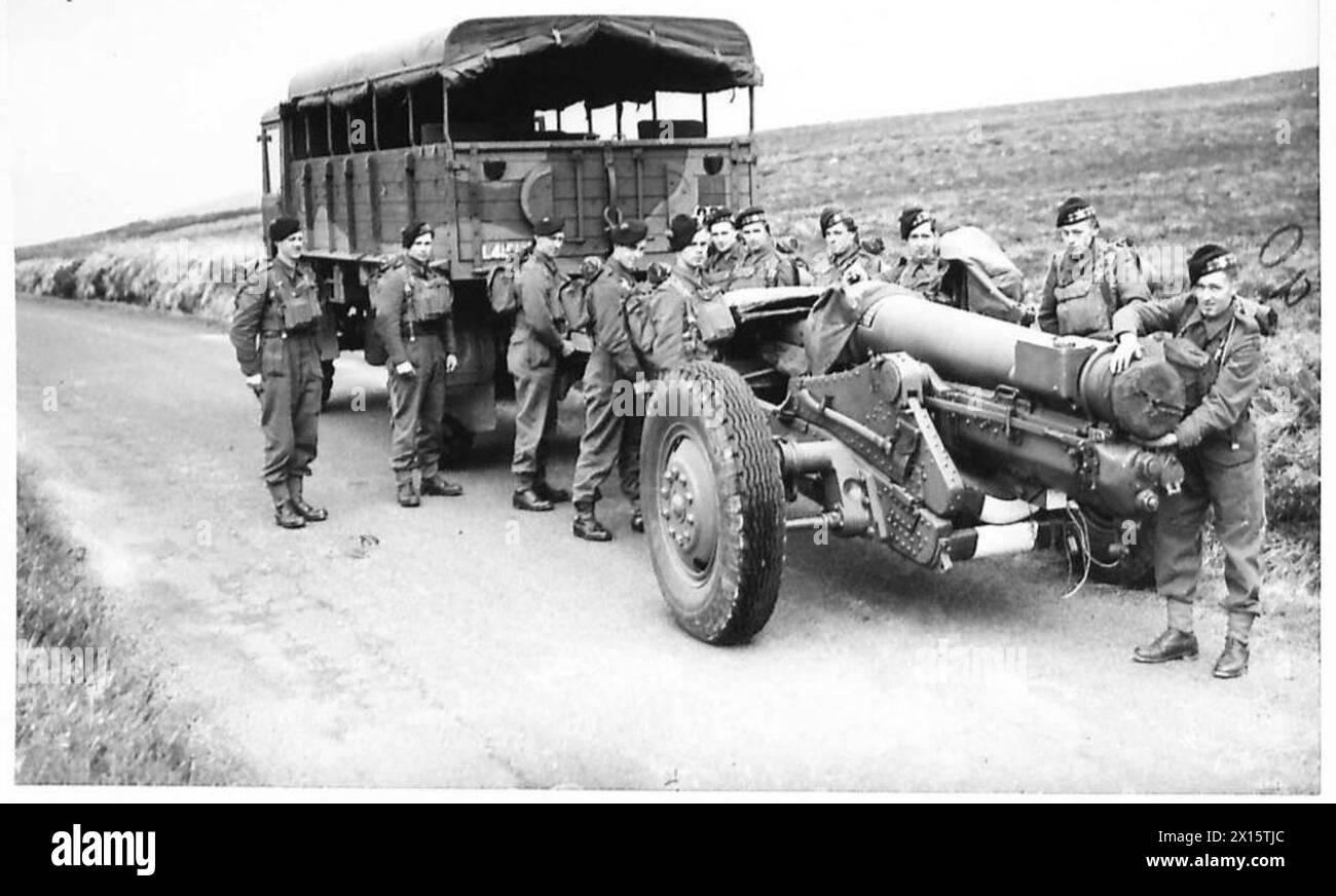 A group of Scottish gunners operate a field gun as part of British Army ...