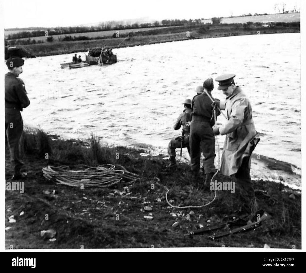 A British Army Brigadier supervises soldiers transporting personnel and ...