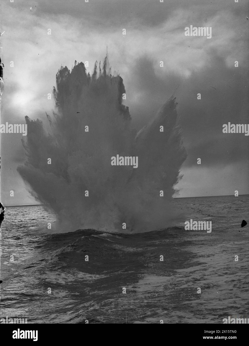 On 3 February 1943, a depth charge explodes astern on board the British ...
