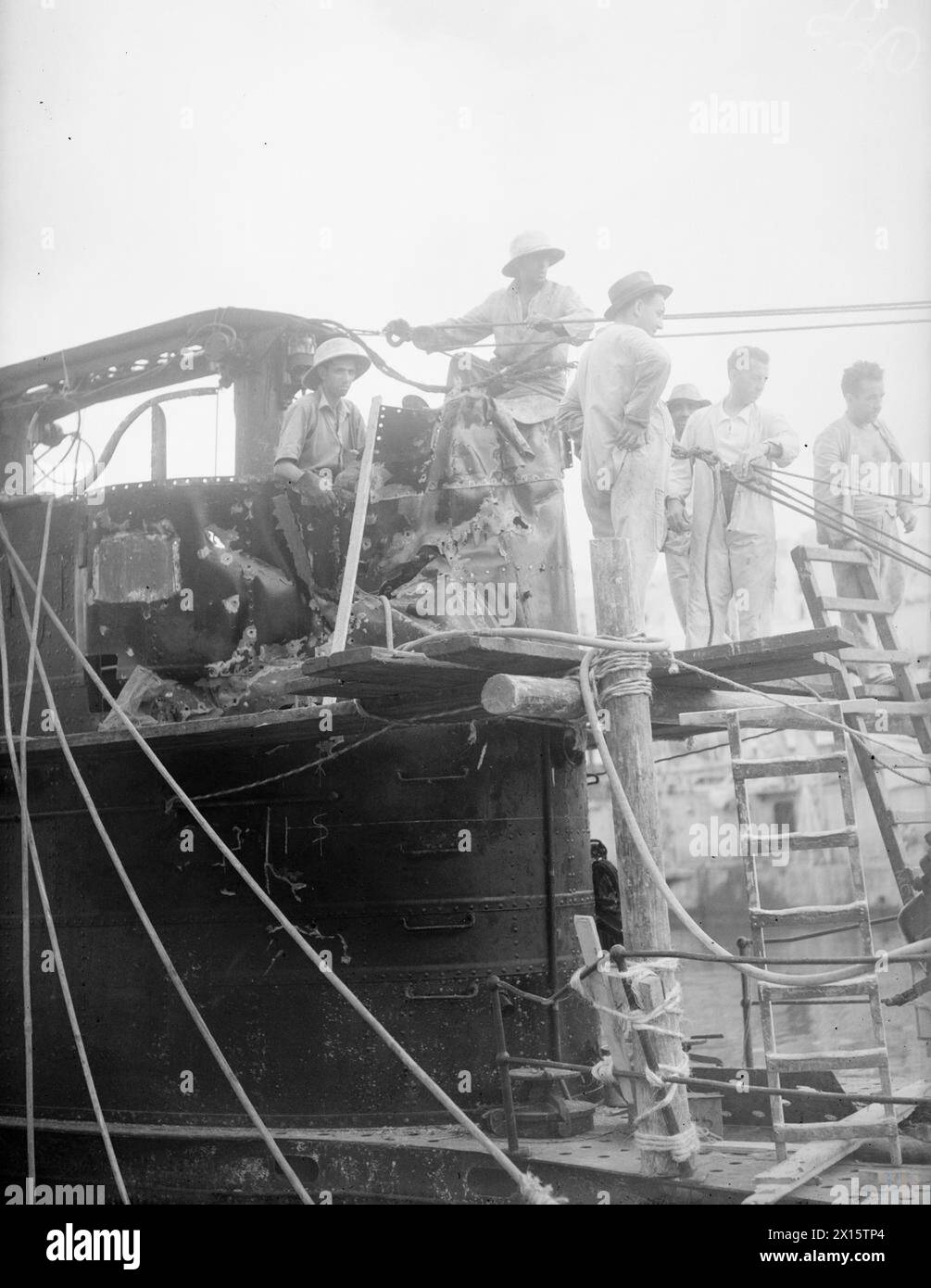 ACTIVITY IN MALTA DOCKYARD. 19-24 AUGUST 1942. - Damage to the conning ...