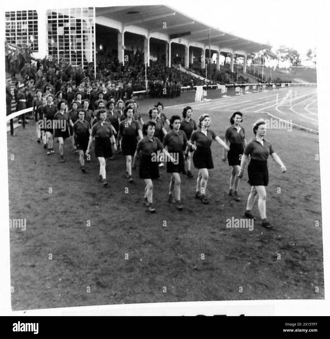 A.T.S. competitors march around the Düsseldorf Stadium during the ...