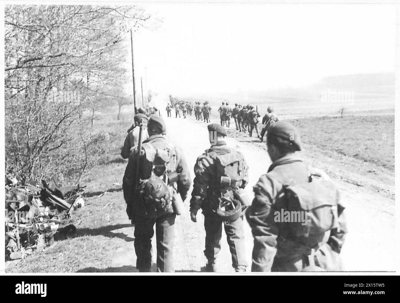 ADVANCE OF 6TH AIRBORNE DIVISION - Troops advancing across open country ...