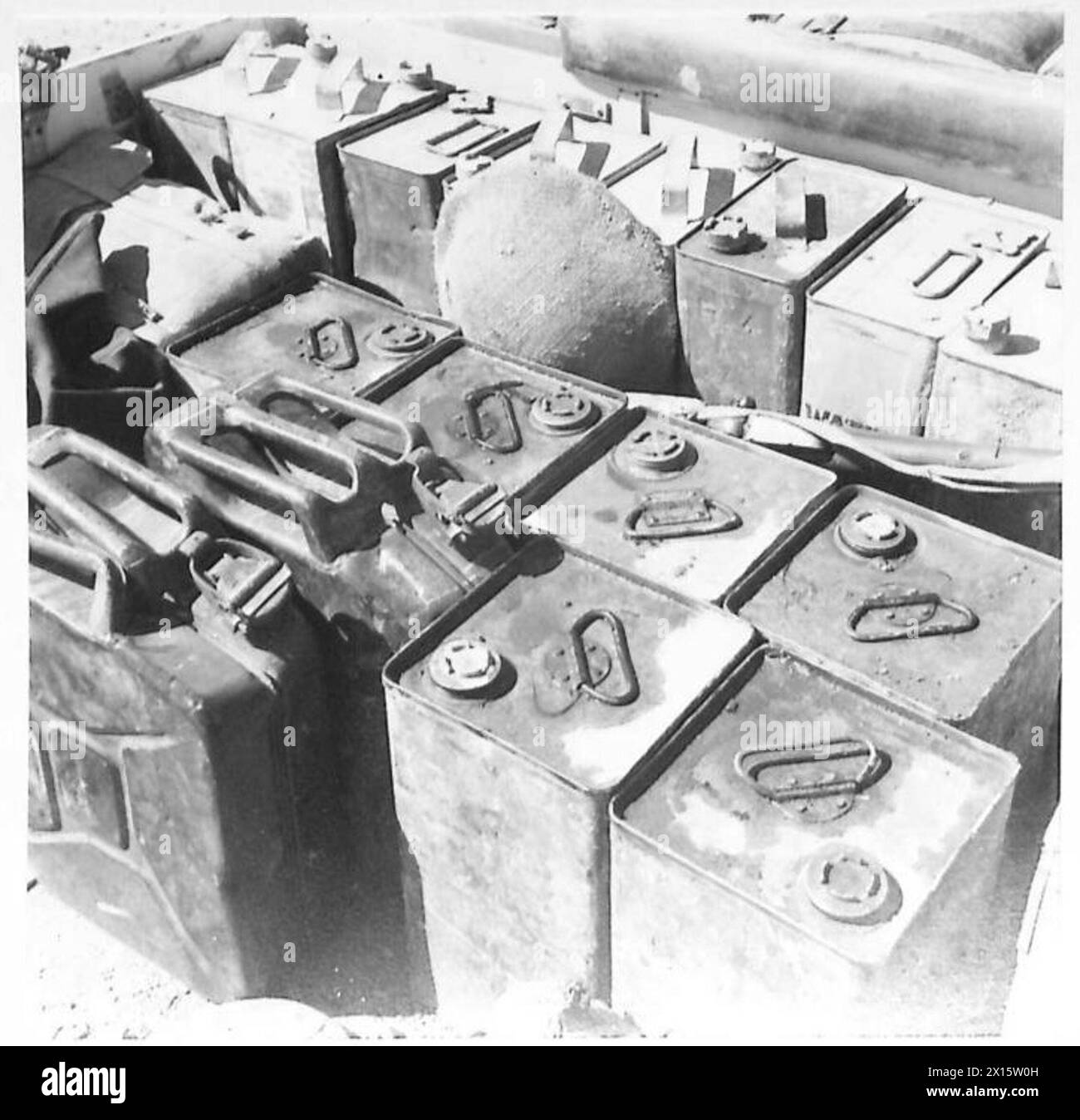 British and German petrol cans are shown in the Western Desert; British ...