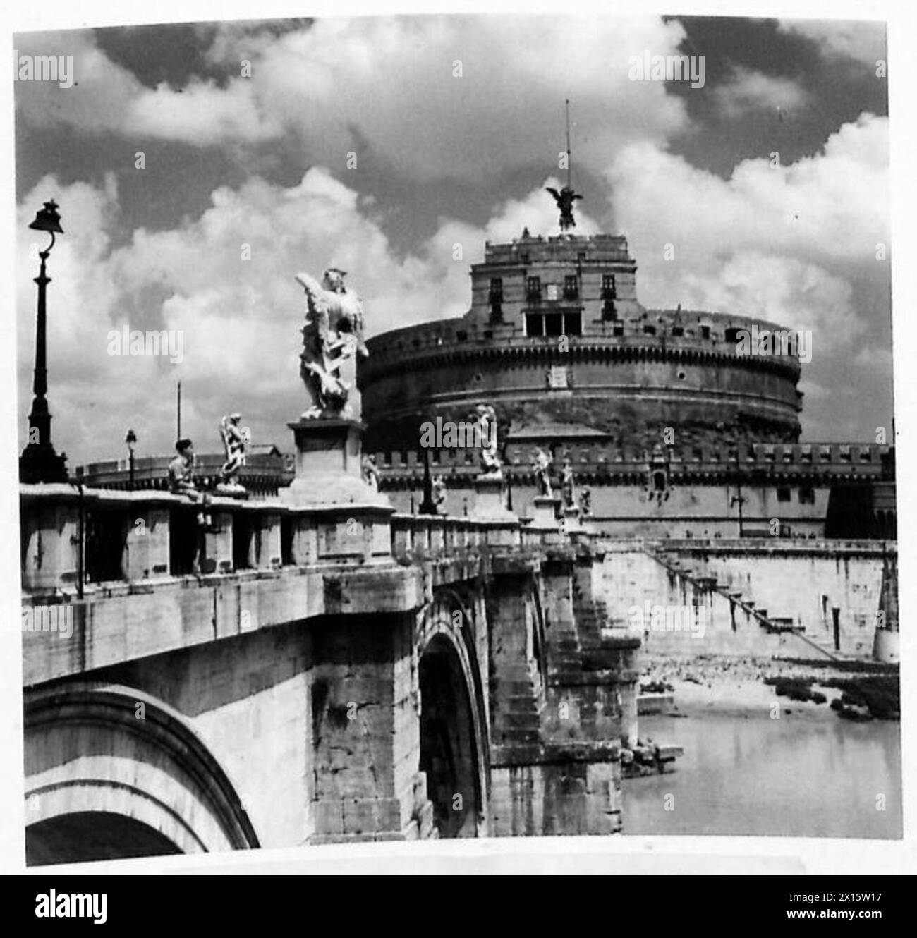 Gunner Smith observes the River Tiber from the parapet of Saint Angelo ...