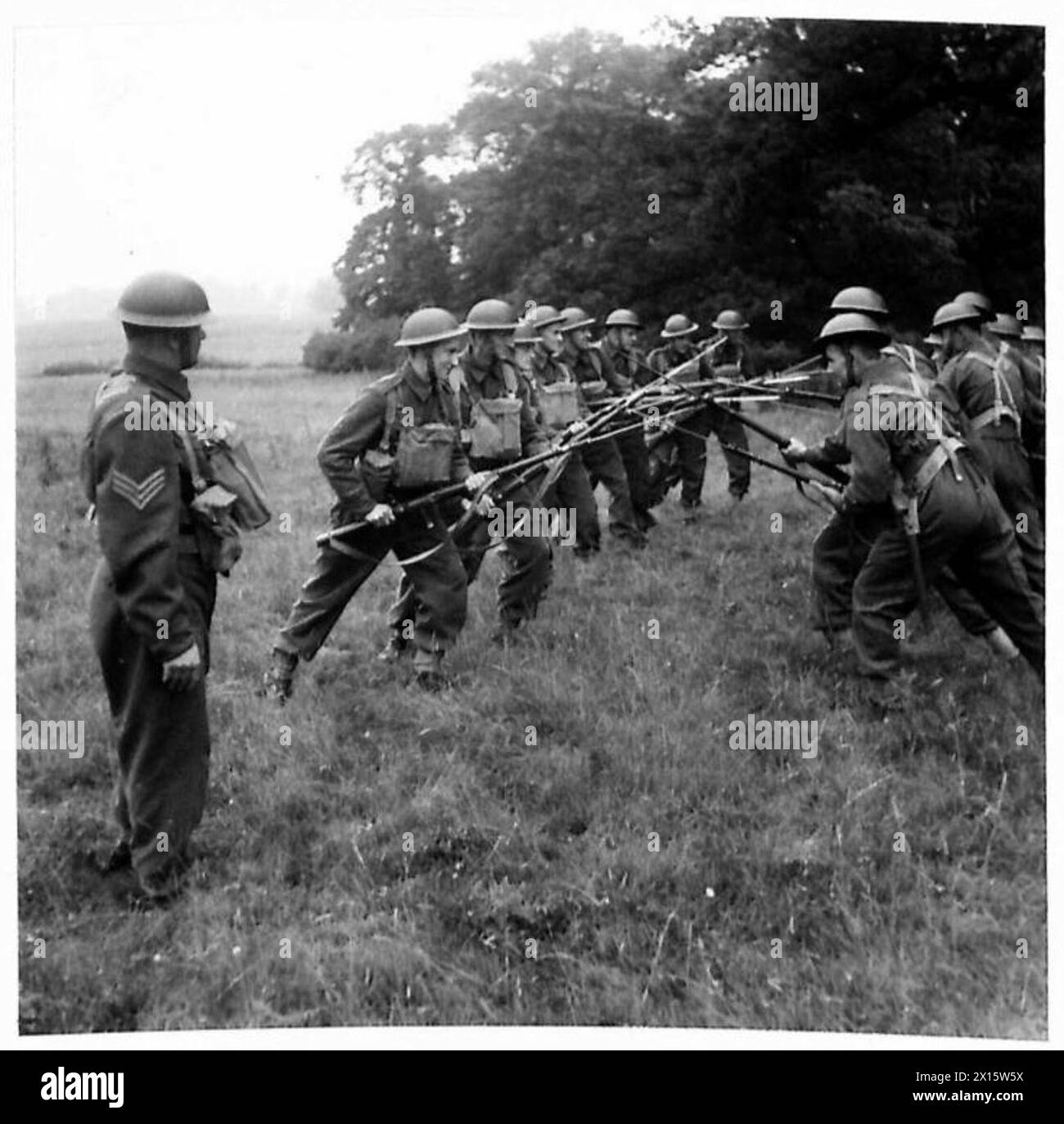 Canadian troops receive instruction in bayonet fighting while training ...