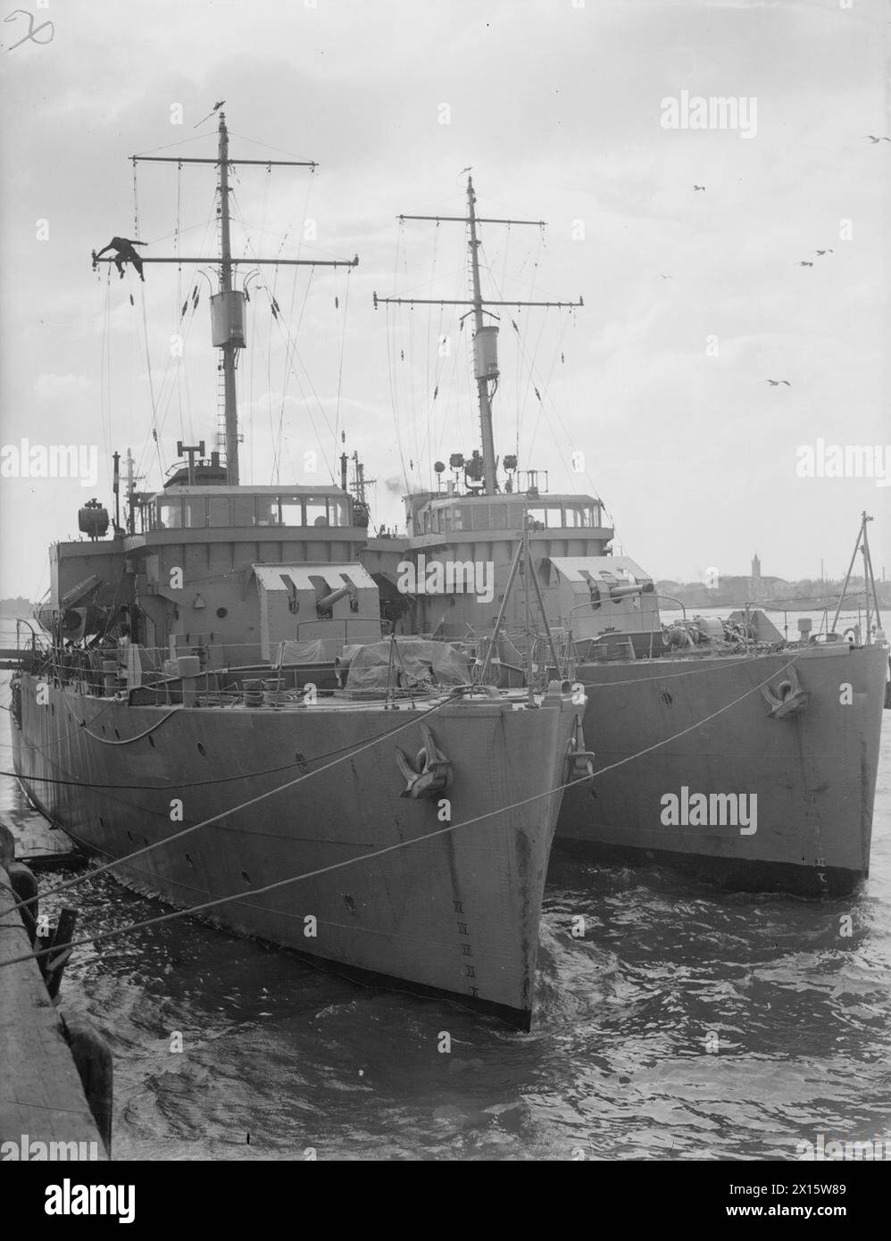 MINESWEEPERS. 28 OCTOBER 1941, PORTSMOUTH. - Left to right: HMS SIDMOUTH and HMS BANGOR HMS ...