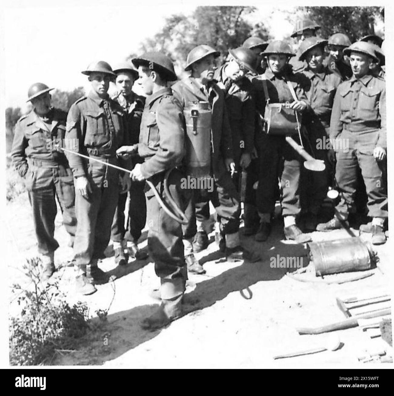 Major Carter demonstrates the use of a malarial sprayer at Anzio ...