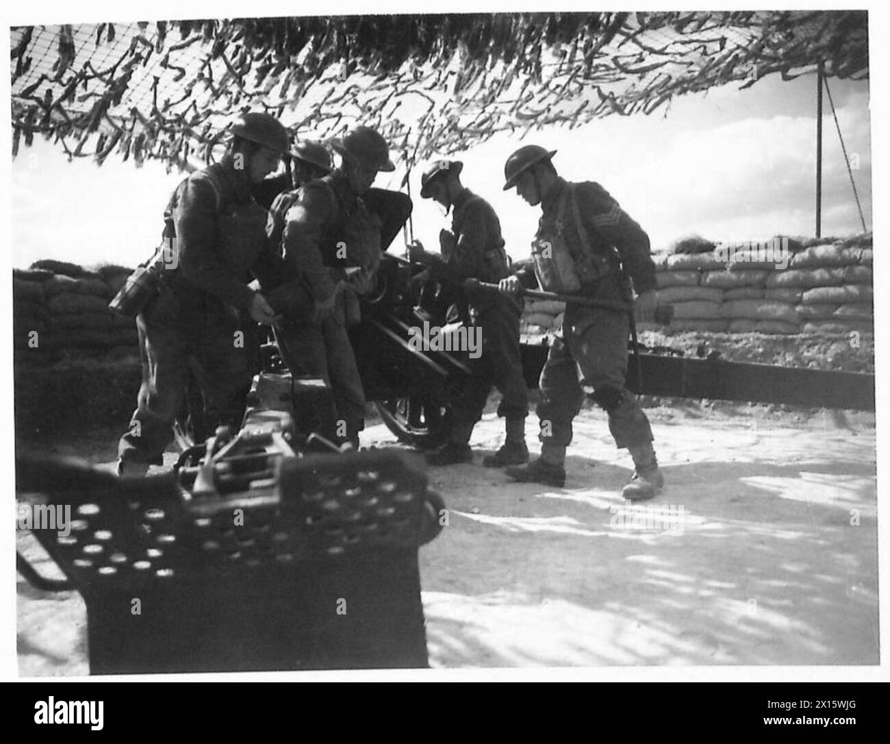 READY FOR USE AGAINST THEIR FORMER OWNERS - The crew at action stations , British Army Stock ...