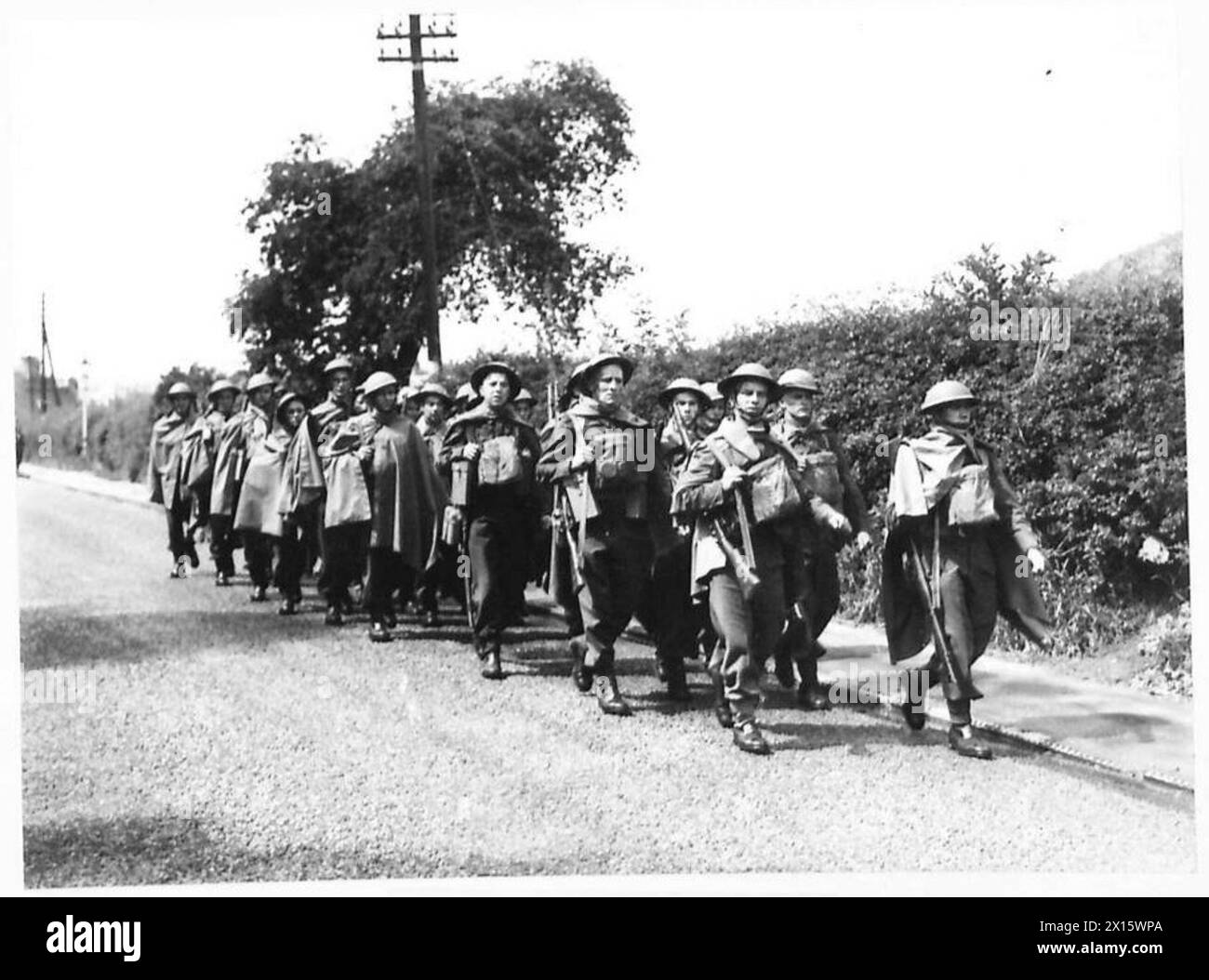 ROYAL ARTILLERY IN TRAINING - Some of the troops on a route march ...