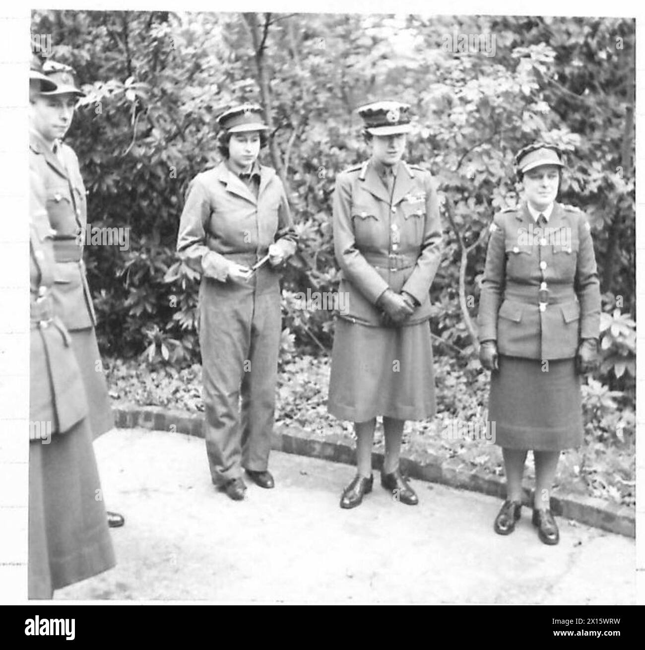 H.R.H. THE PRINCESS ROYAL VISITS A.T.S. M.T.CENTRE - H.R.H.the Princess Royal [centre] with H.R ...