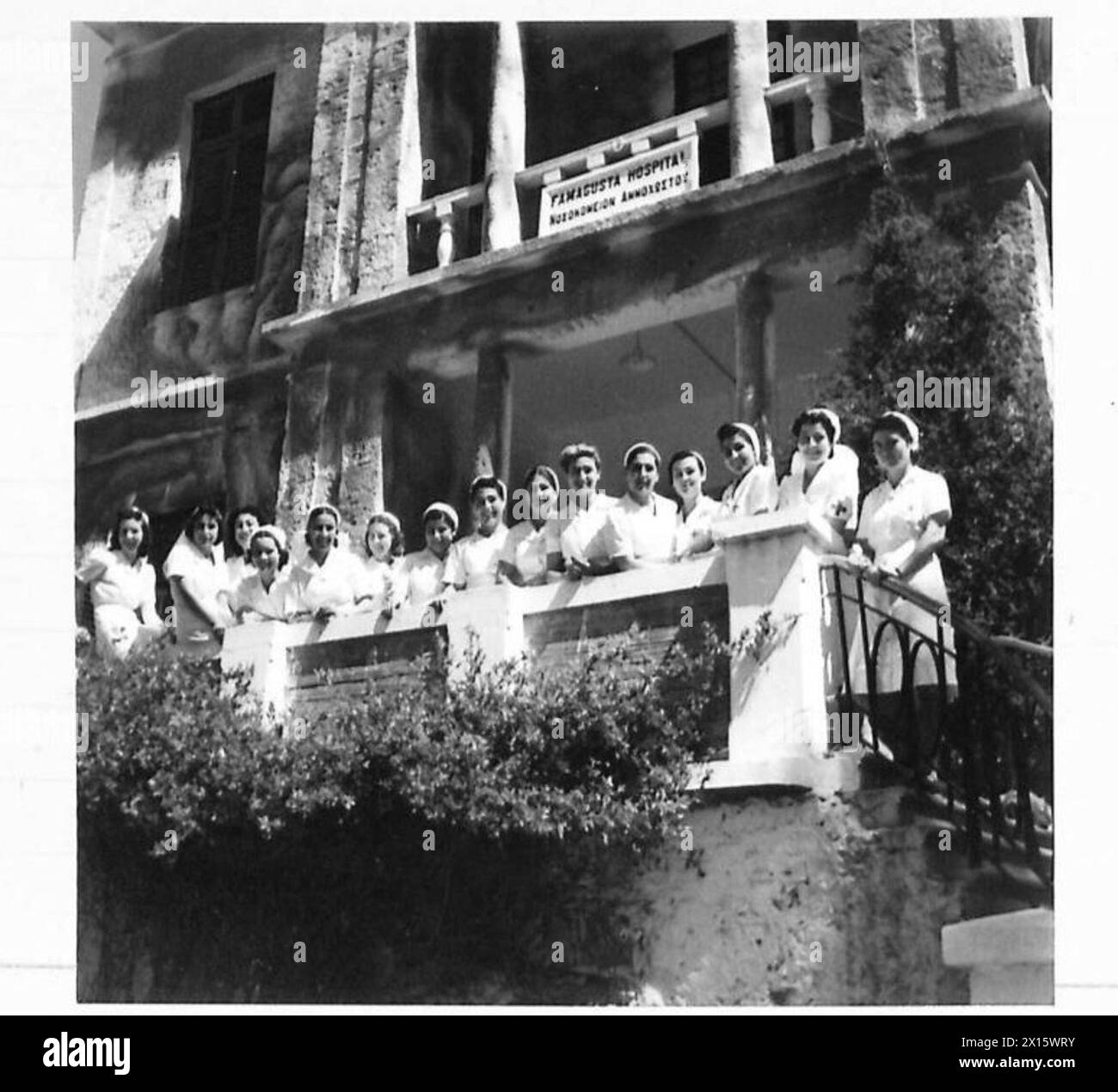 Volunteer nurses in Cyprus pause on a terrace for a short break during ...