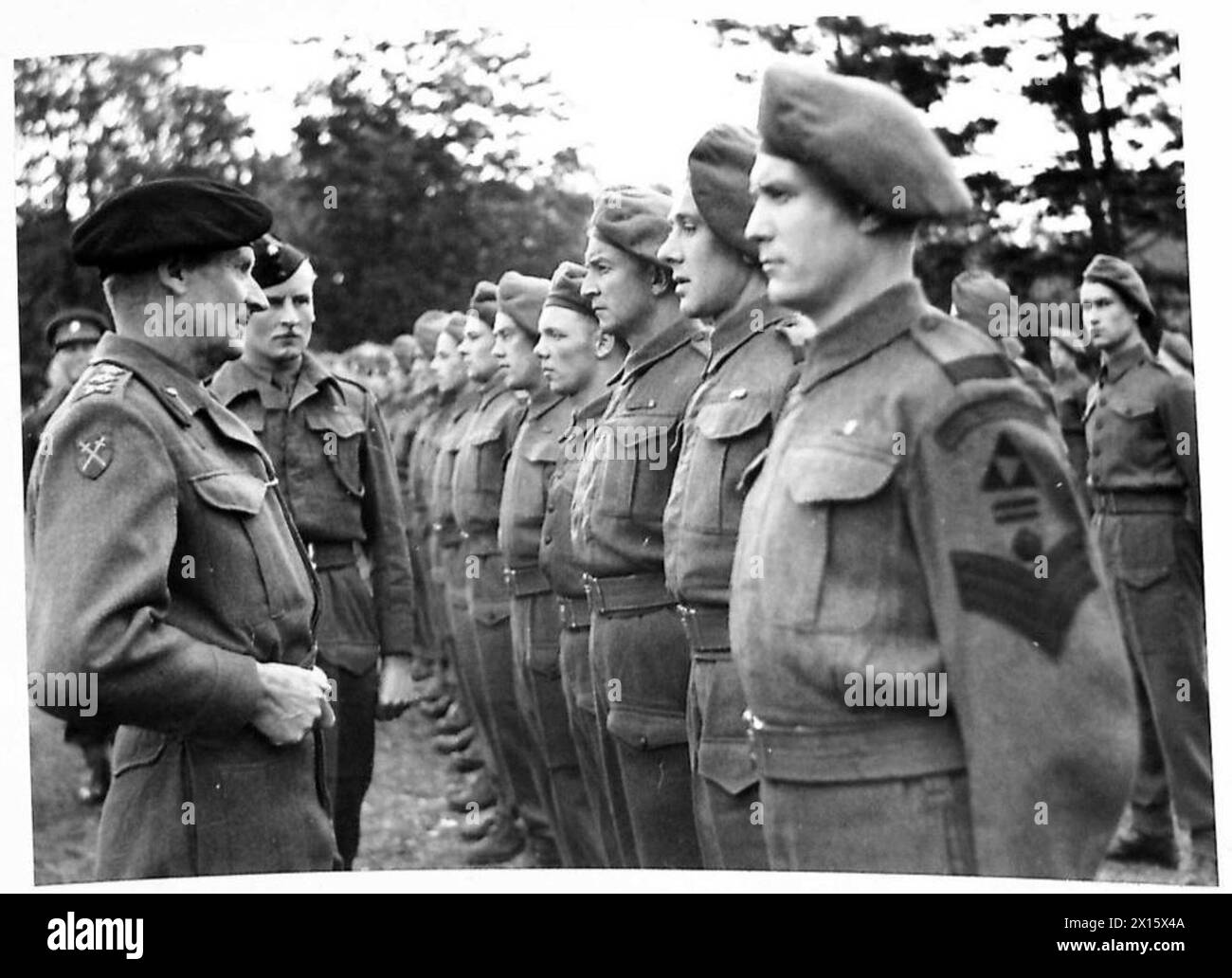 GENERAL MONTGOMERY INSPECTS ROYAL ULSTER RIFLES - General Montgomery stops to talk to Colour ...