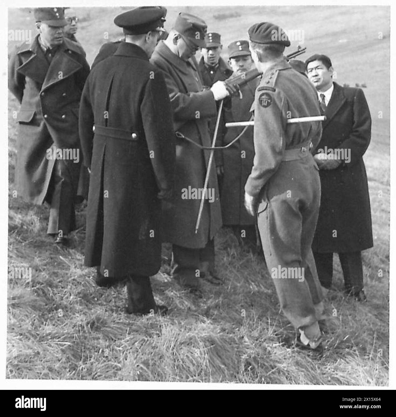 General Yang Chieh examines a Garand rifle following its demonstration ...