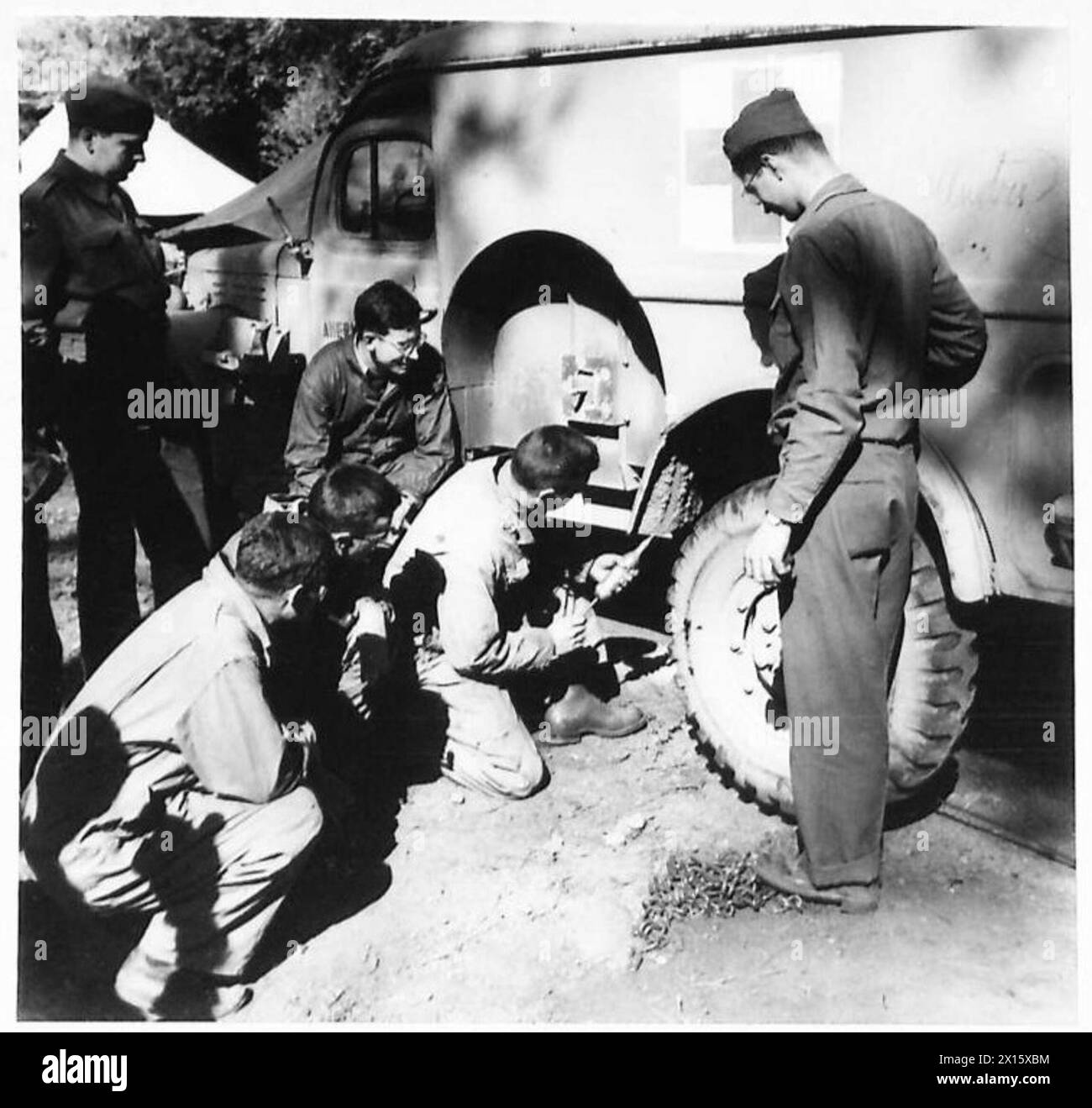 American Field Service volunteers with the Eighth Army receive ...