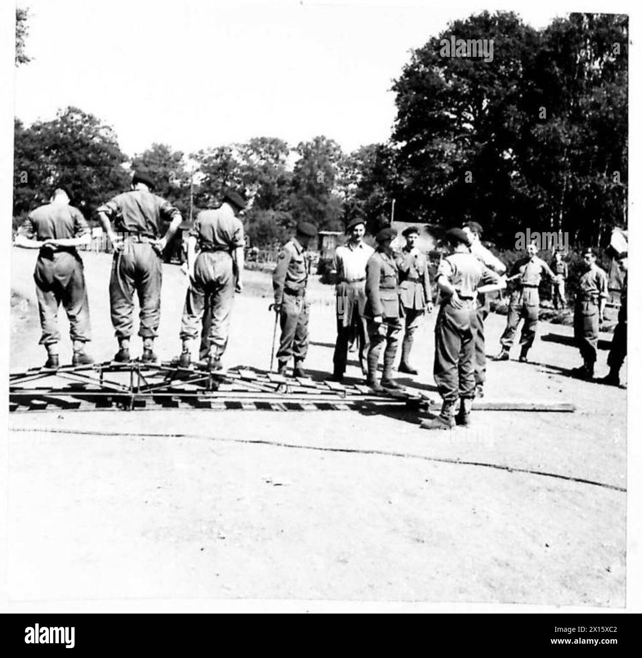A SPECIAL SERVICE BRIGADE PREPARES FOR ACTION - A small portable bridge ...