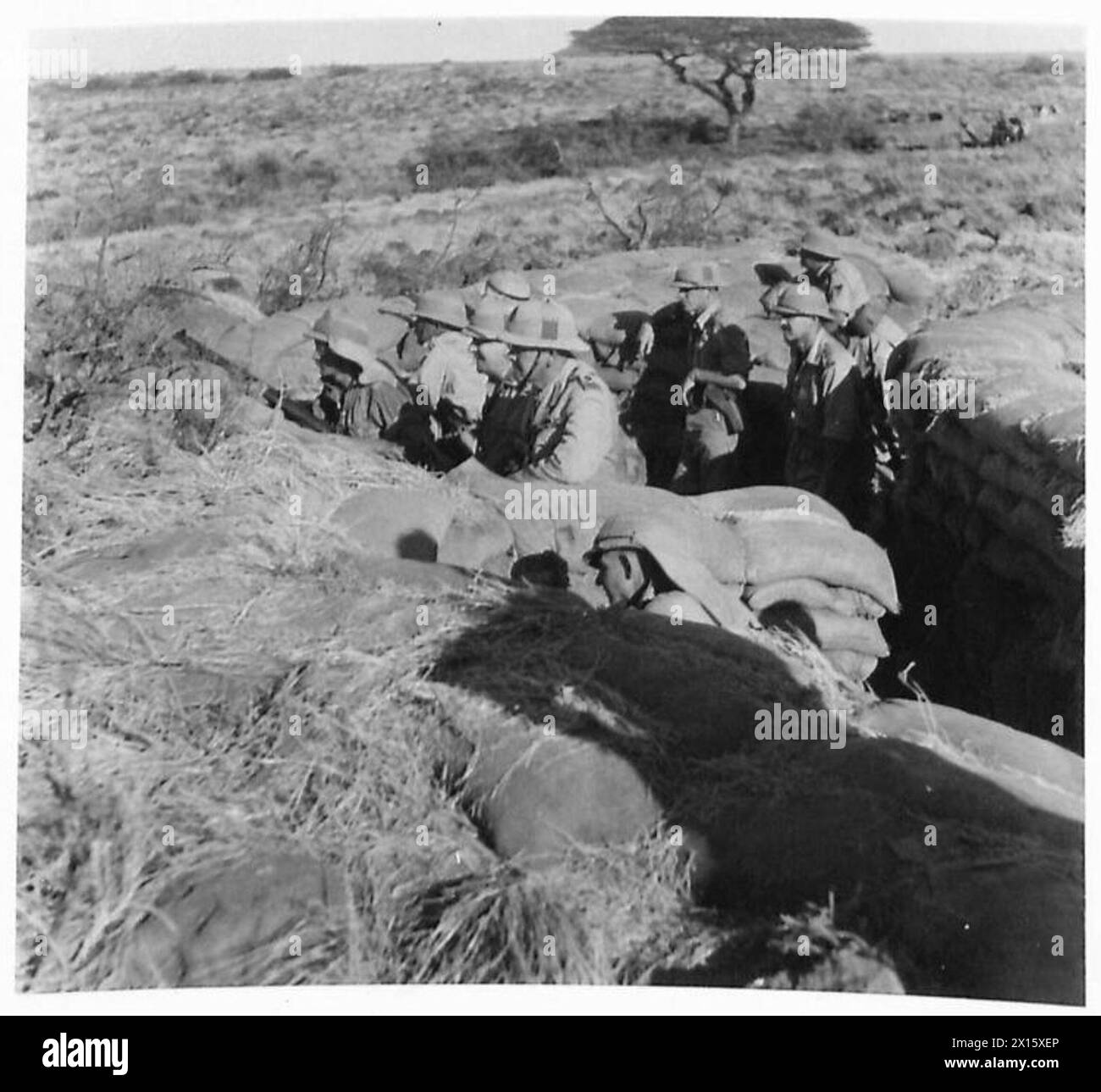 MAJOR-GENERAL G.E. BRINK, D.S.O. INSPECTS THE FORWARD POSITIONS ON THE ...