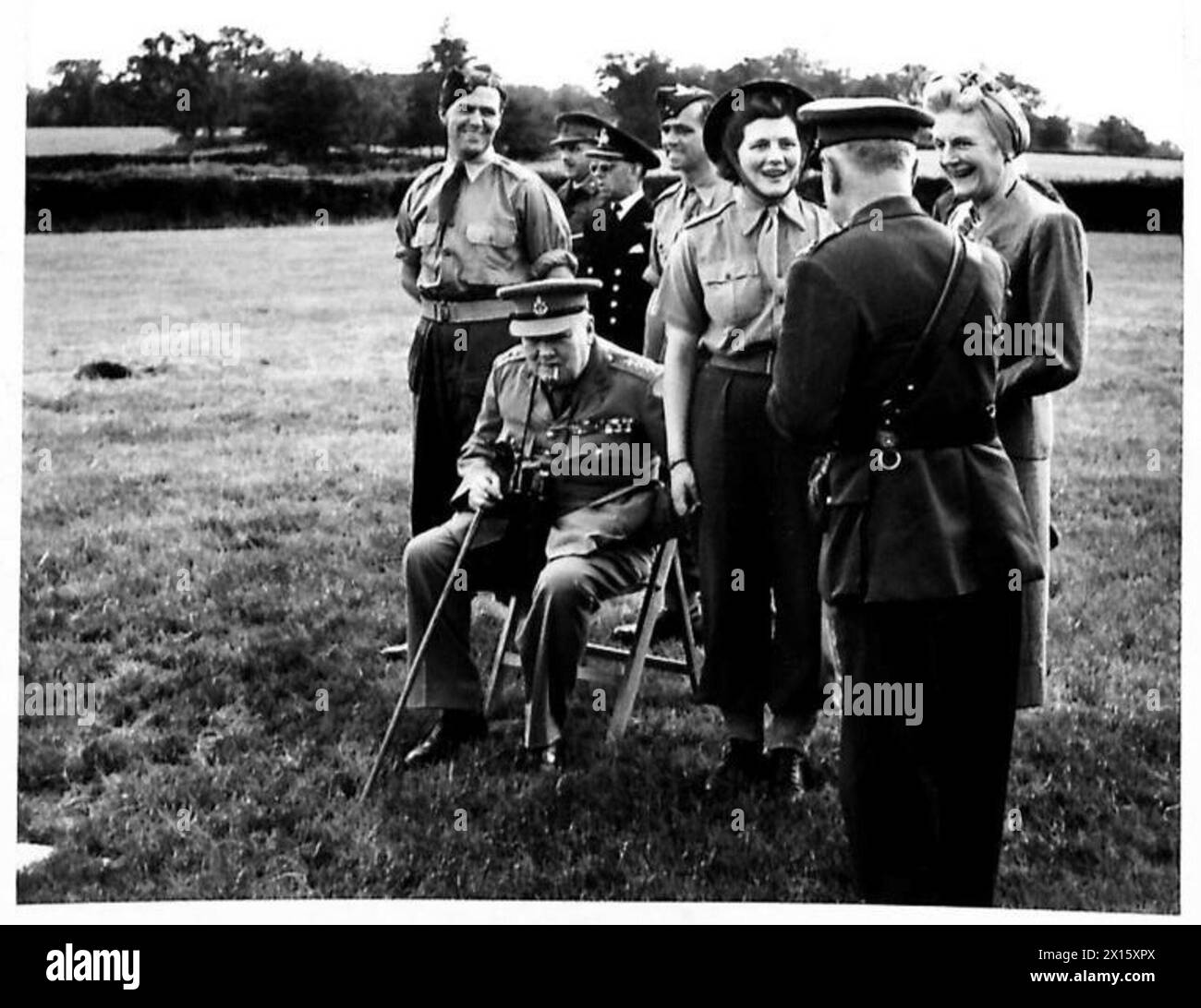 MR. CHURCHILL SEES ANTI-FLYING BOMB DEFENCES - At a Mixed A.A.Battery ...