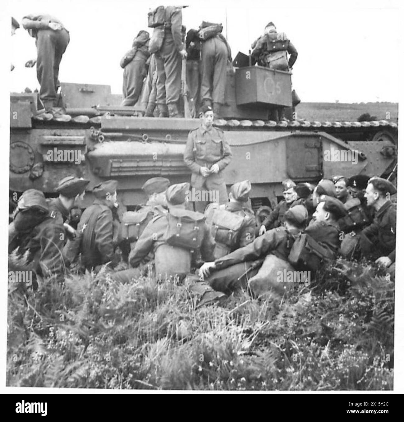 ARMY TANK BRIGADE DEMONSTRATION - A tank trooper talking to troops ...