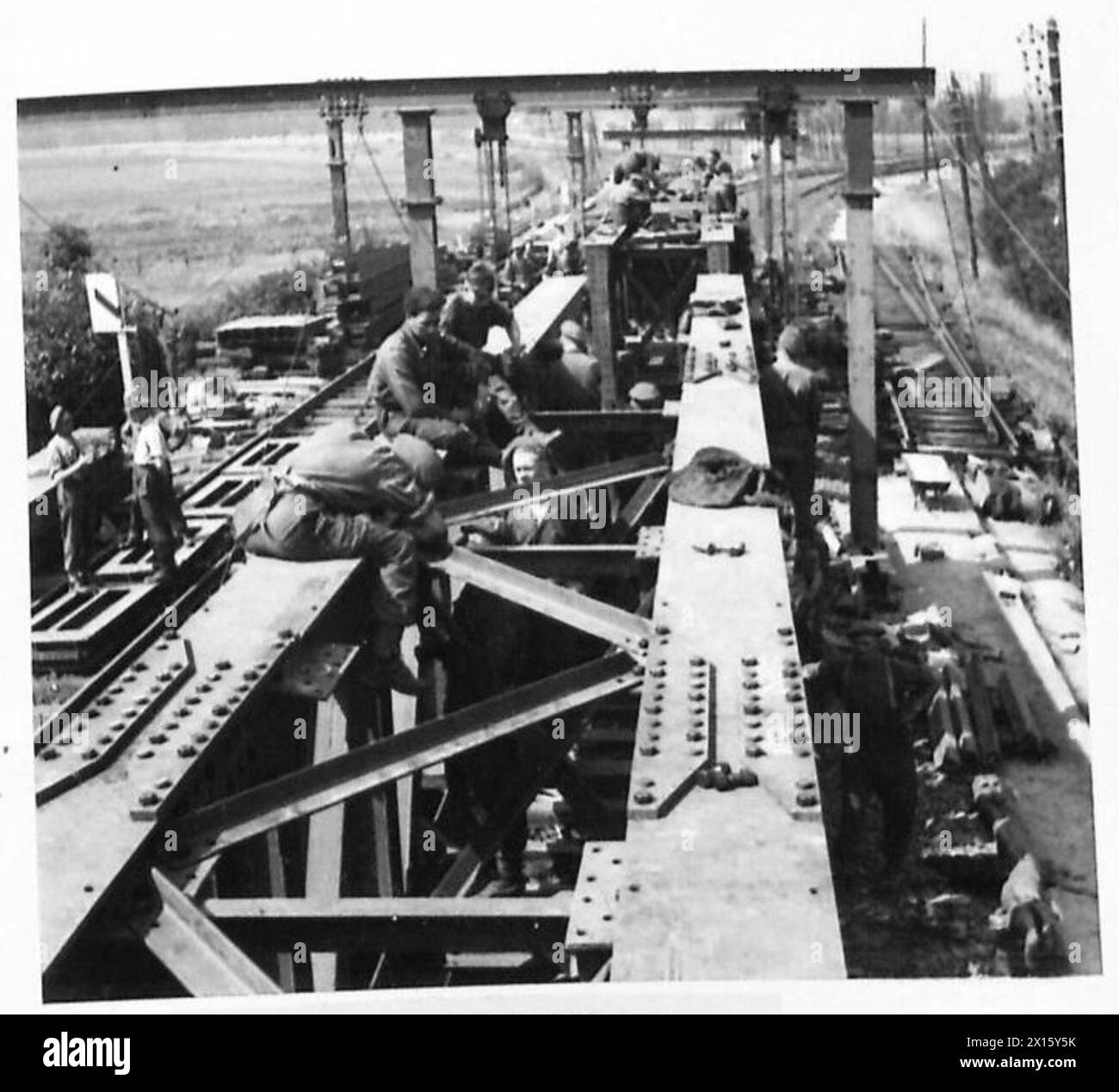 Royal Engineers construct a new railway bridge over the River Orne ...